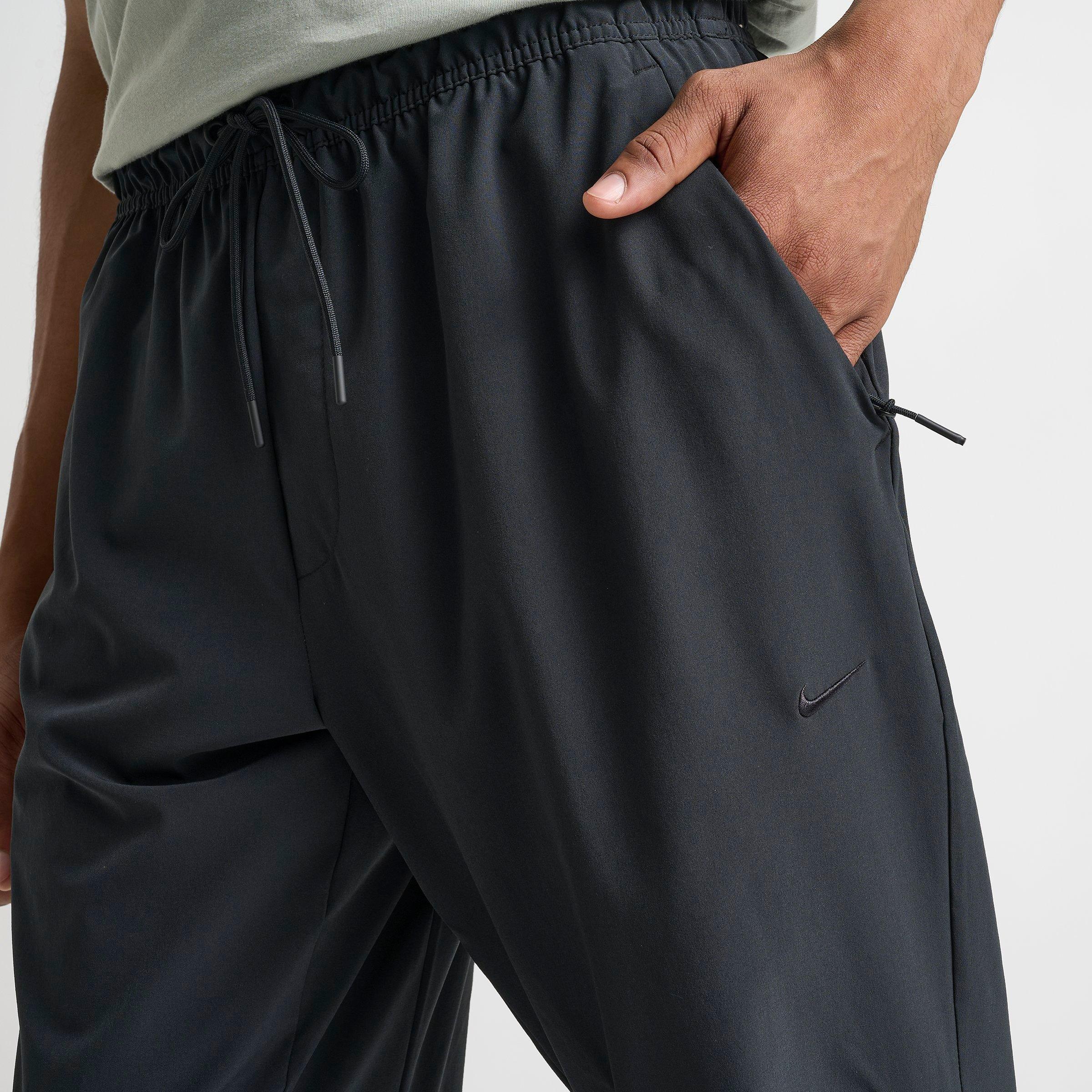 Men's Nike Dri-FIT Unlimited Tapered Leg Versatile Training Pants | JD ...