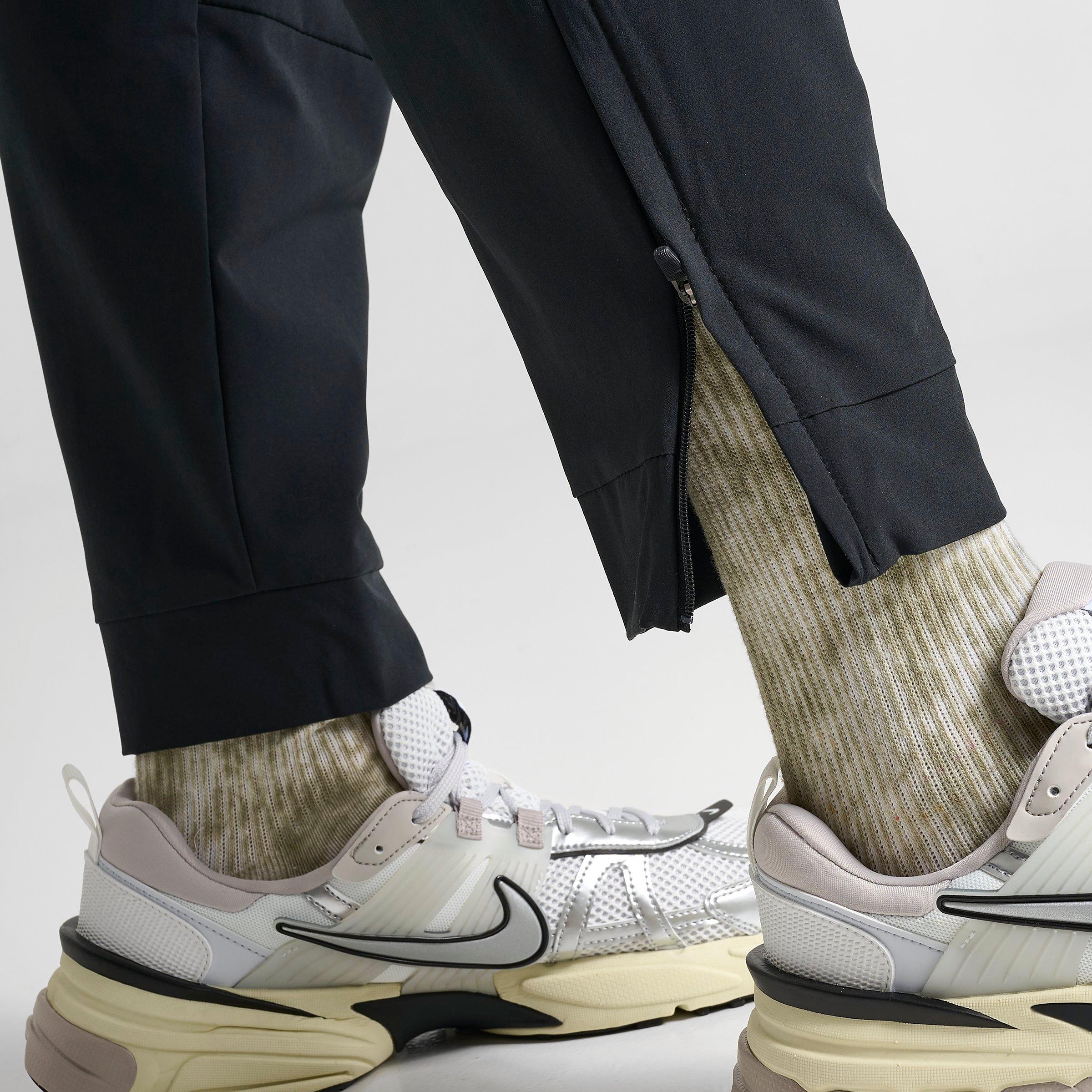 Men's Nike Dri-FIT Unlimited Tapered Leg Versatile Training Pants | JD ...