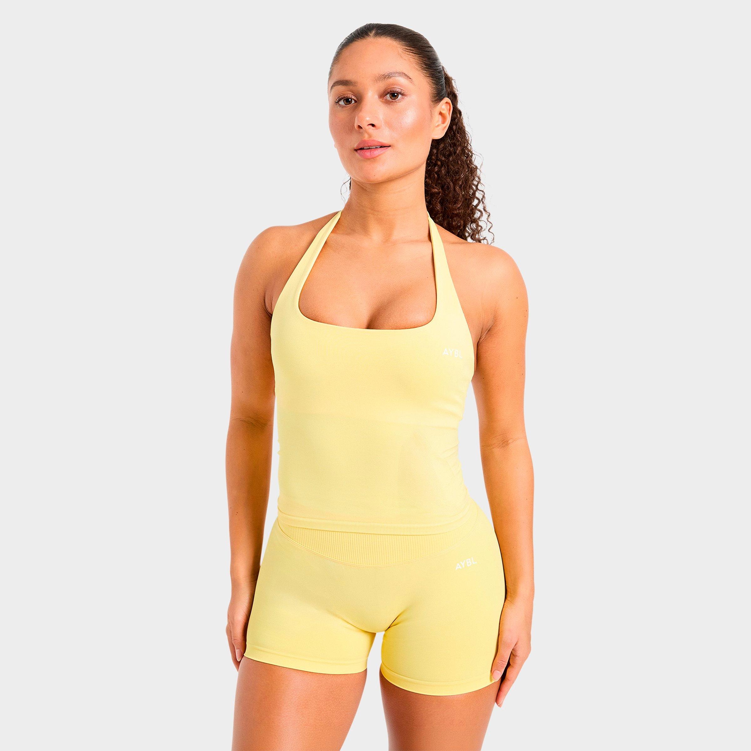 Click here for AYBL Womens Enhance Seamless Halterneck Top in Bri... prices