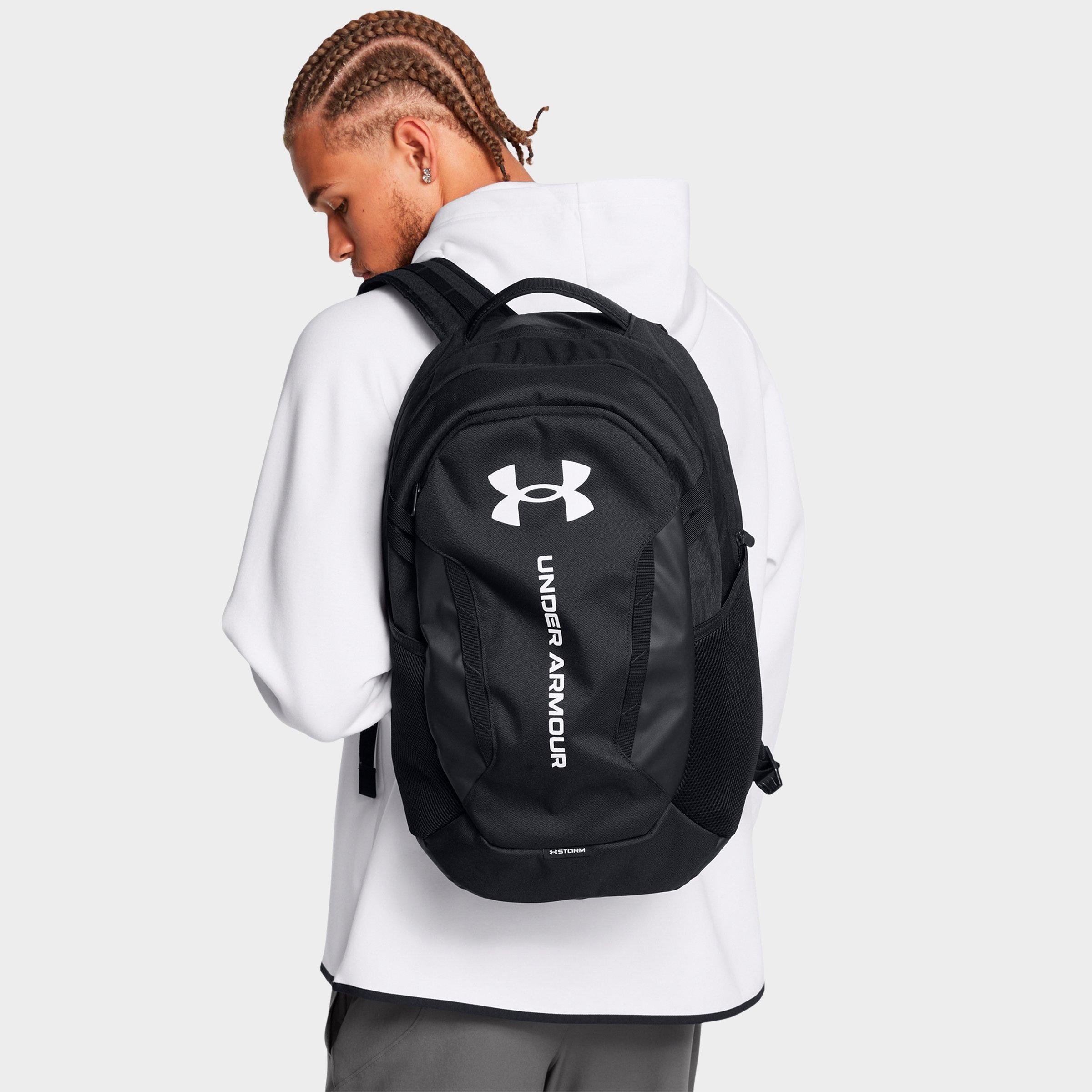 Click here for Under Armour Hustle 6.0 Backpack (29L) in Black/Wh... prices