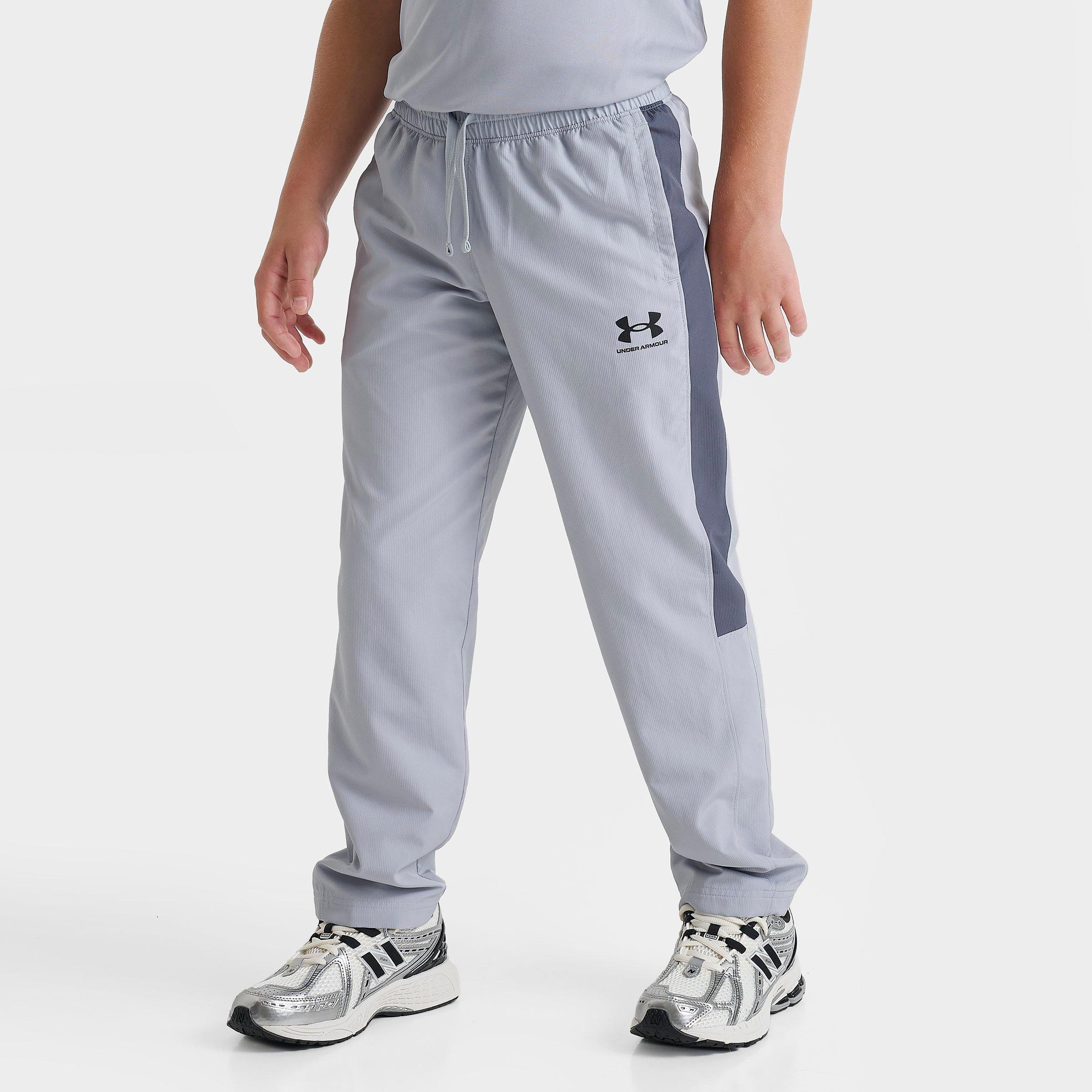 Click here for Under Armour Big Kids Rival Woven Pants in Mod Gre... prices