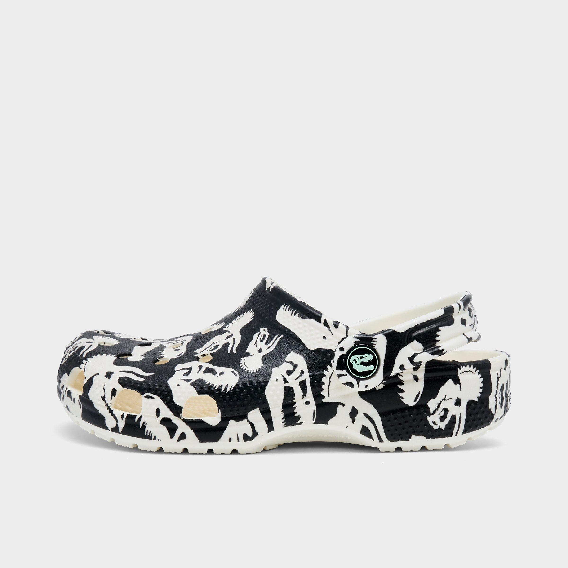 Click here for Crocs Little Kids Dino Glow Classic Clog Shoes in... prices