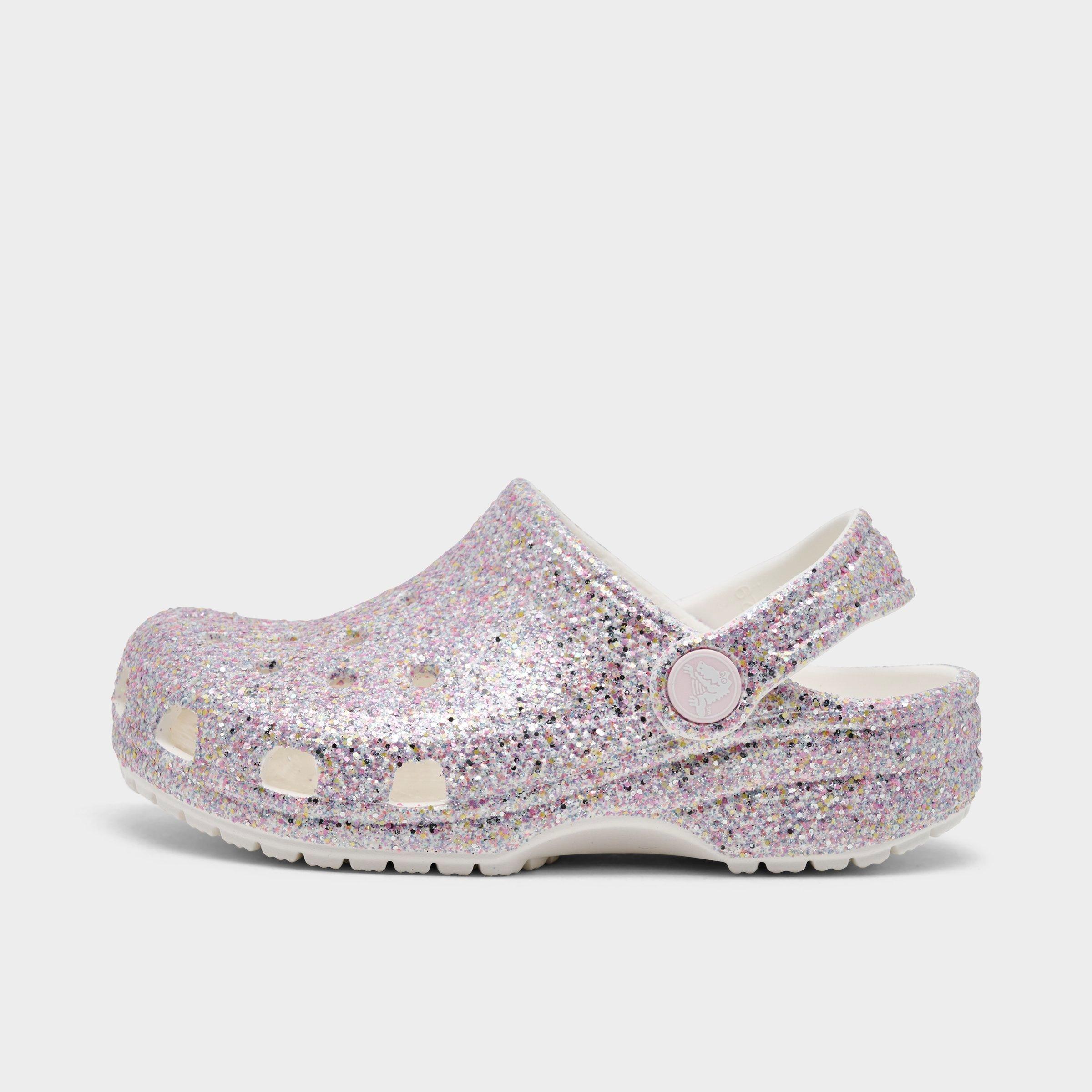 Click here for Crocs Girls Toddler Classic Glitter Clog Shoes in... prices