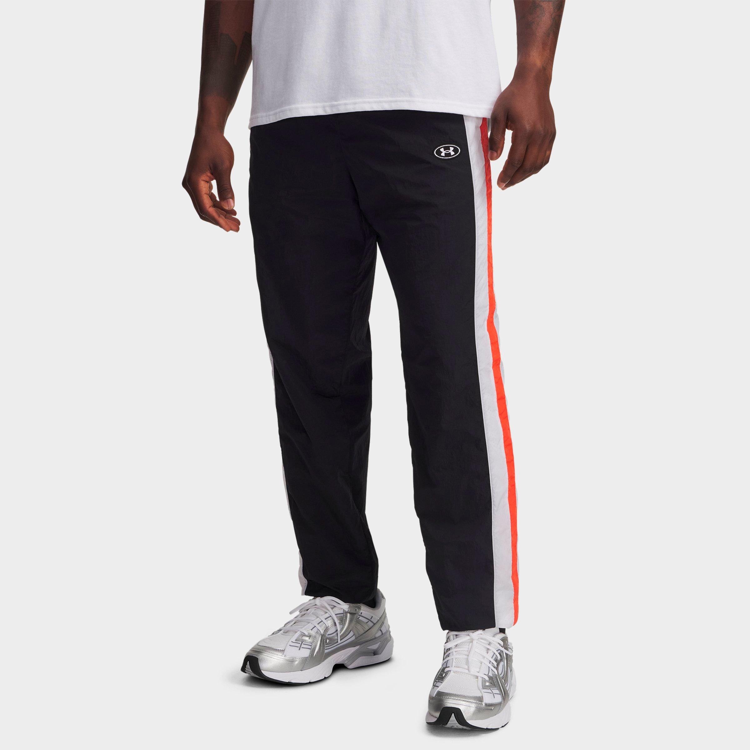 Click here for Under Armour Mens UA Icon Woven Track Pants in Bla... prices