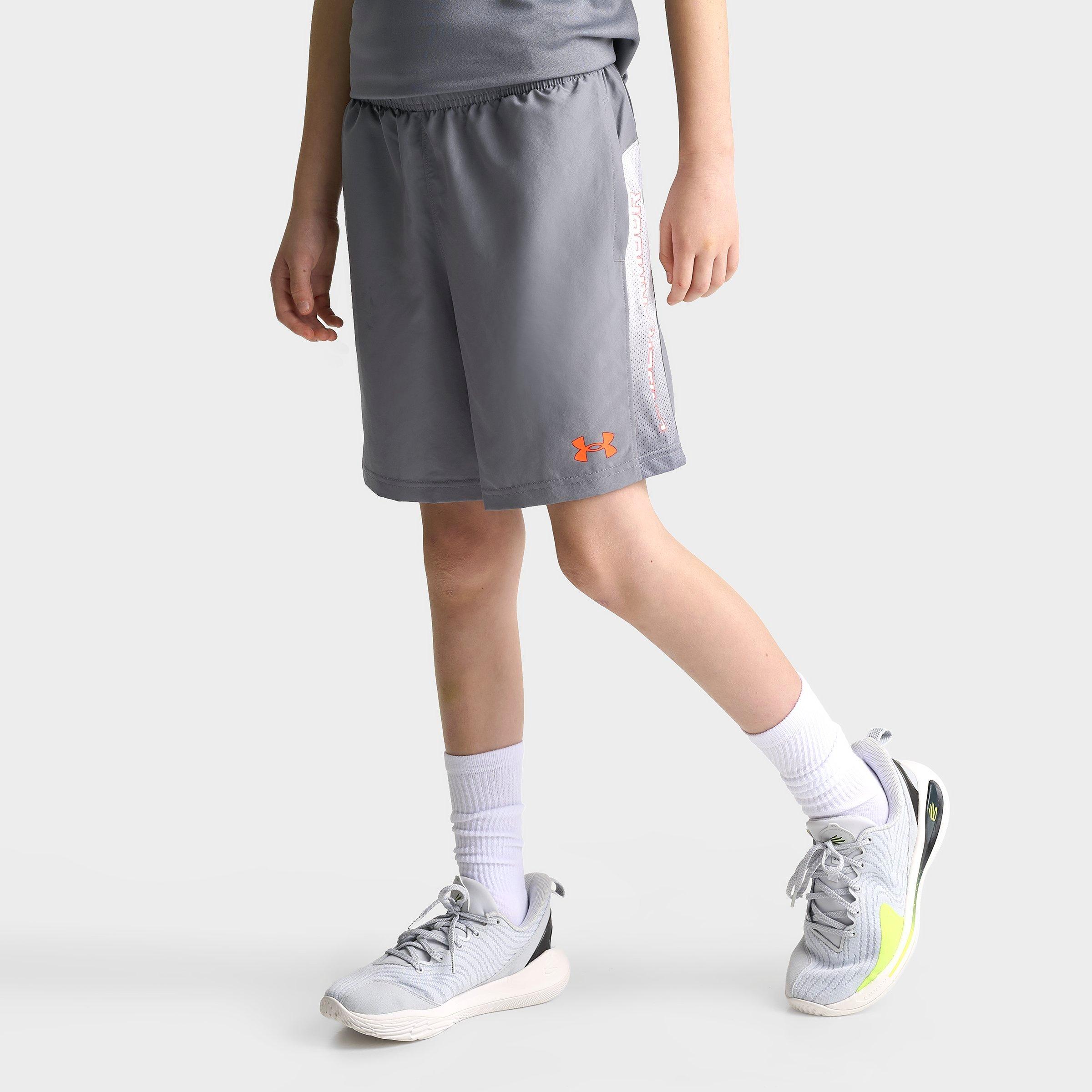 Click here for Under Armour Big Kids Fade Woven Shorts in Titan G... prices