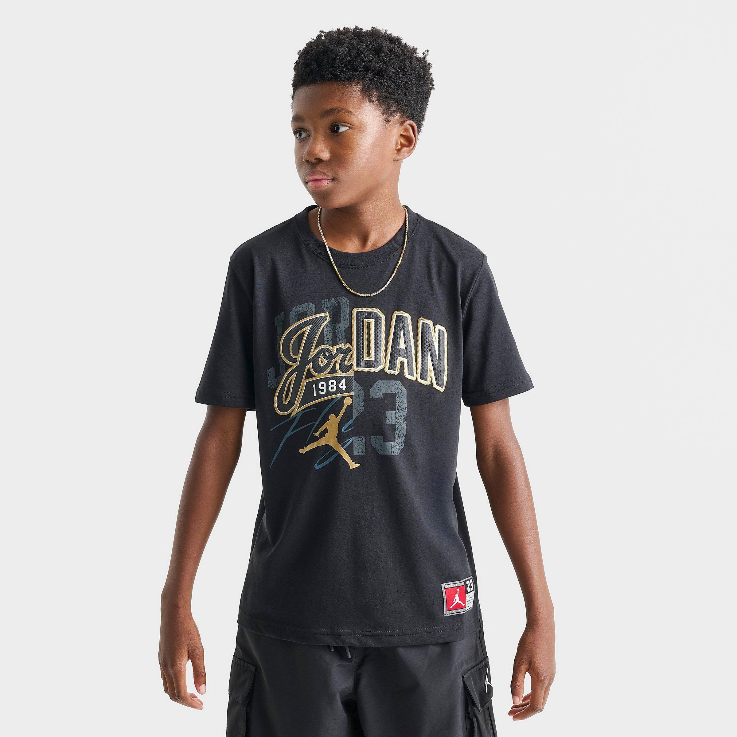 Click here for Jordan Big Kids Varsity Split T-Shirt in Black/Met... prices