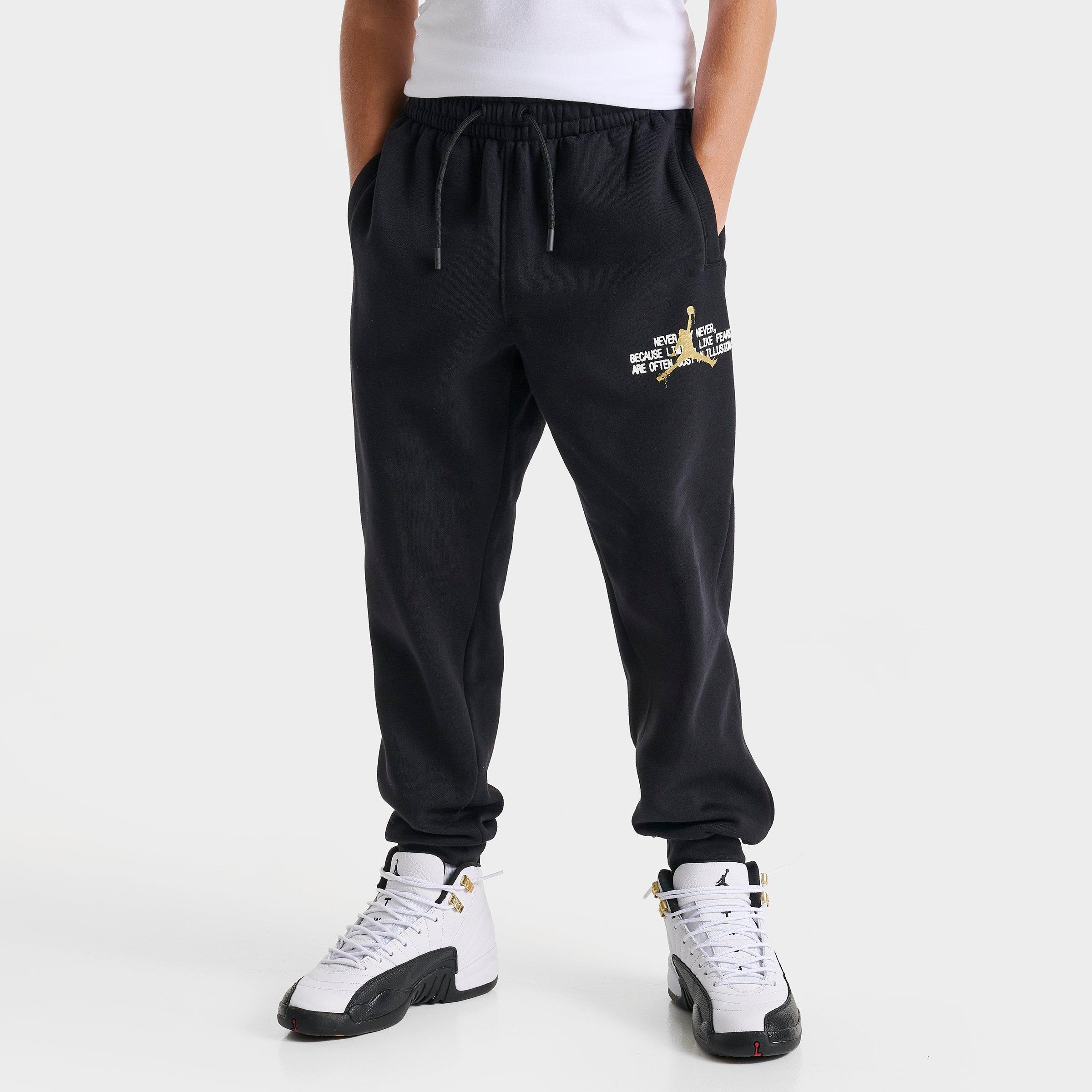 Click here for Jordan Kids Jumpman Stamp Jogger Pants in Black/Me... prices