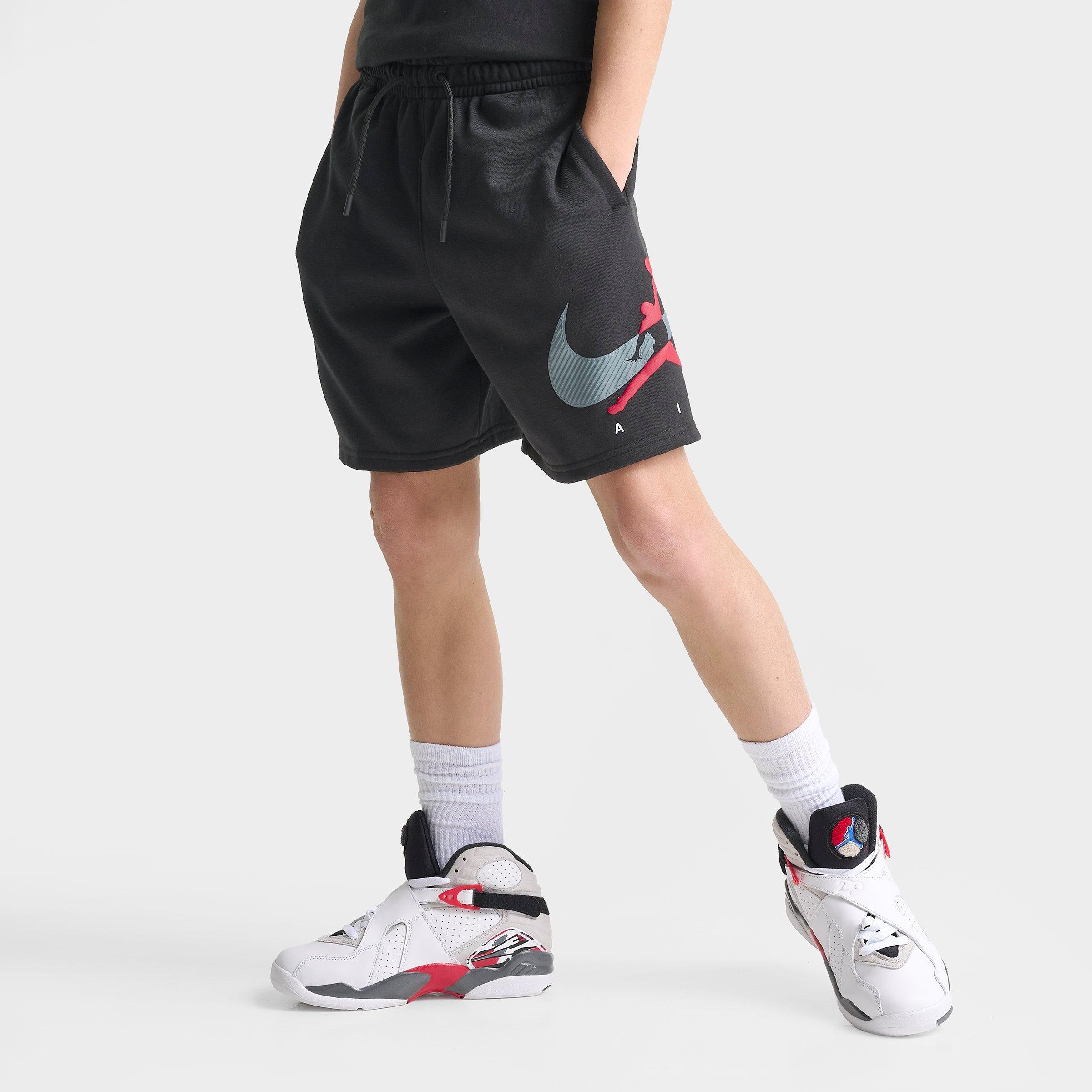 Click here for Jordan Big Kids Air Swoosh Fleece Shorts in Black... prices