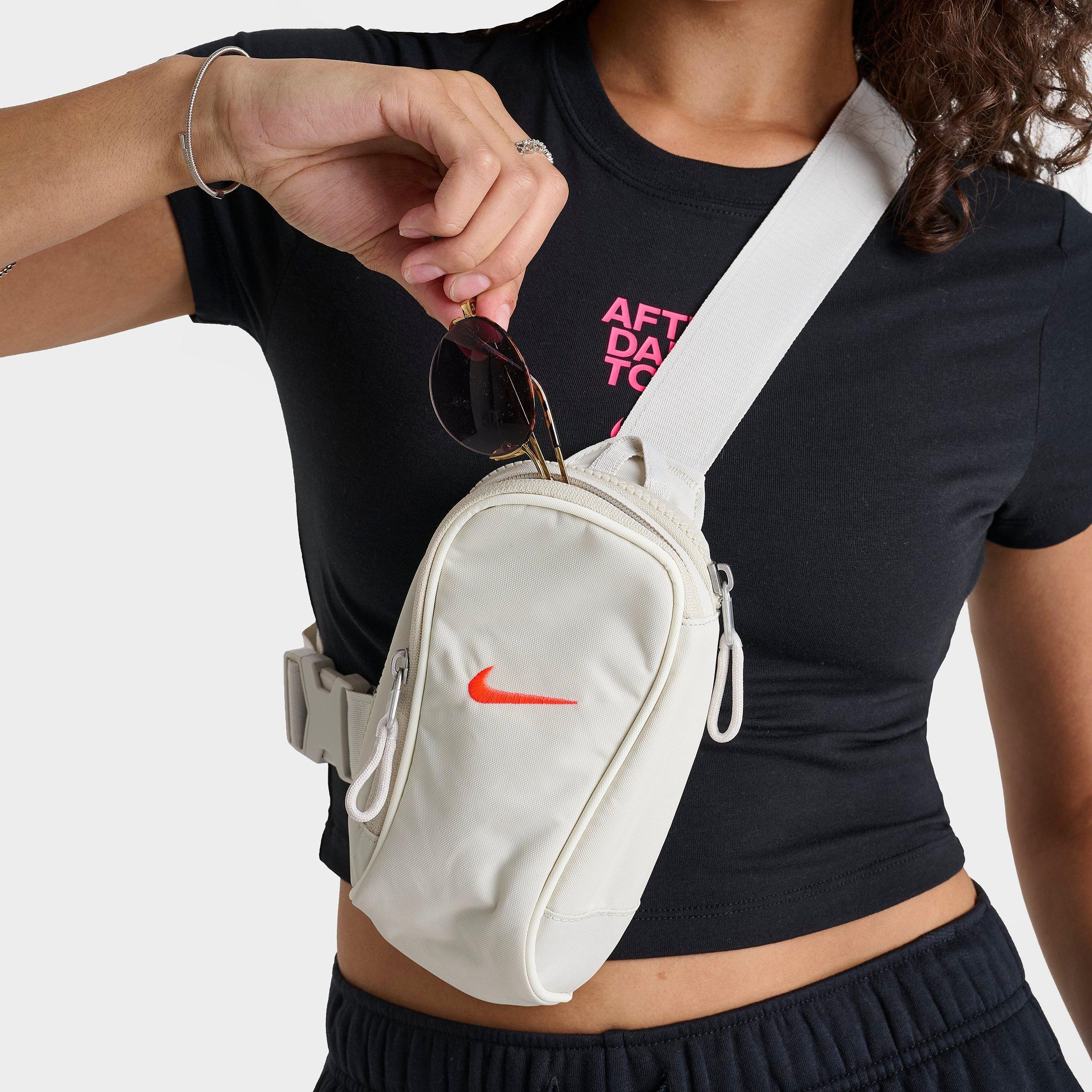 Click here for Nike Sportswear Essentials Crossbody Bag in Off Wh... prices