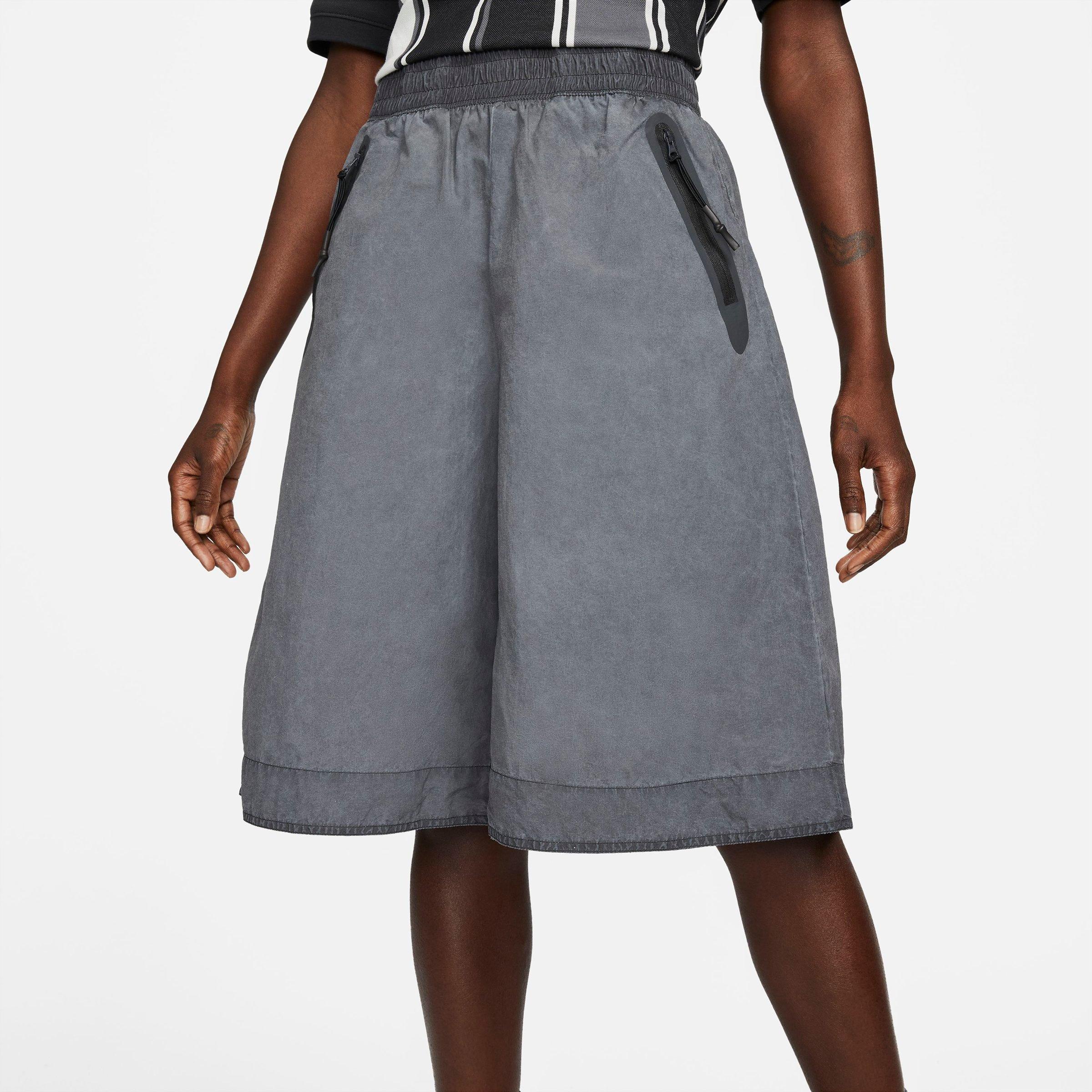 Click here for Nike Womens Sportswear Tech Pack High-Rise Woven S... prices