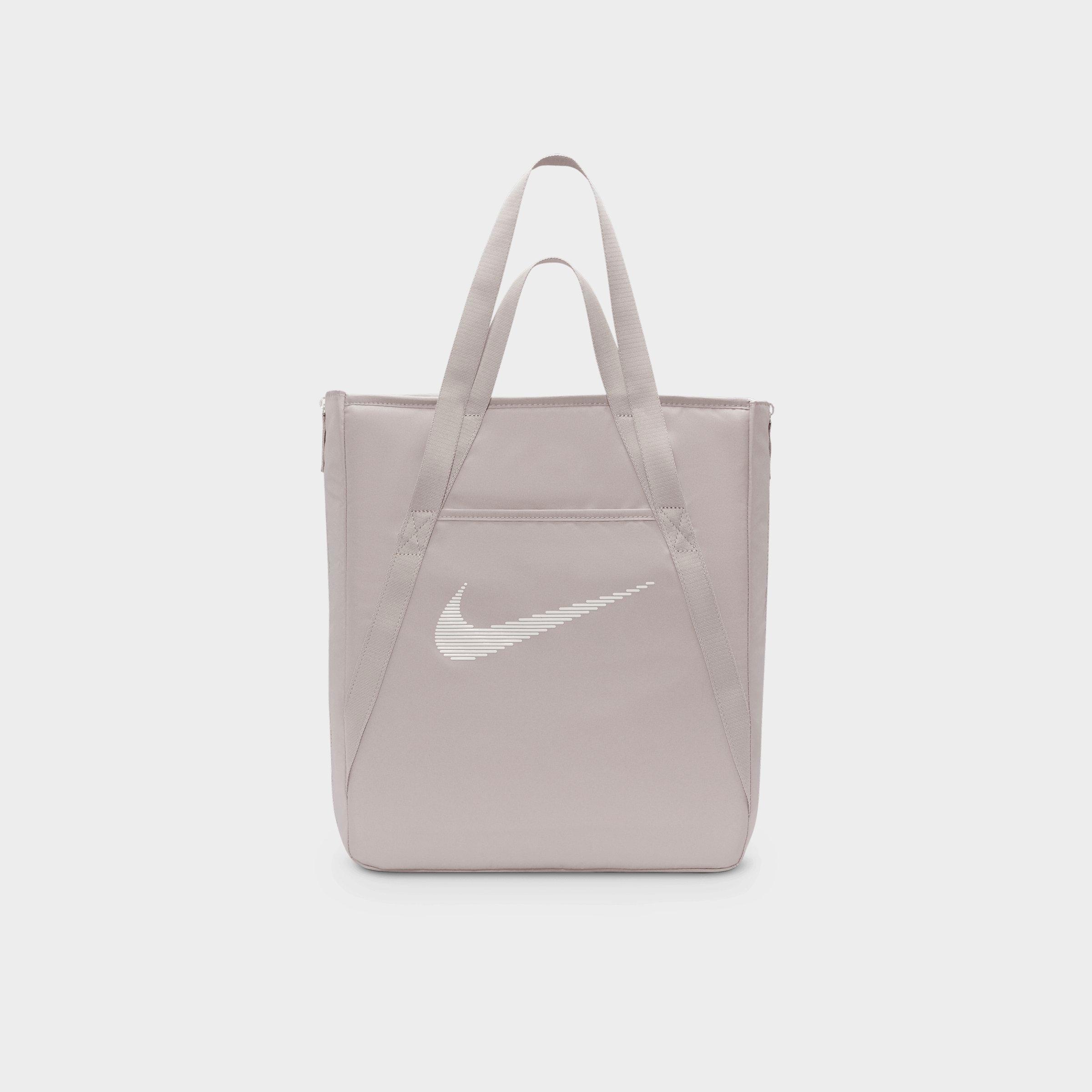 Click here for Nike Womens Gym Tote Bag (28L) in College Grey/Col... prices