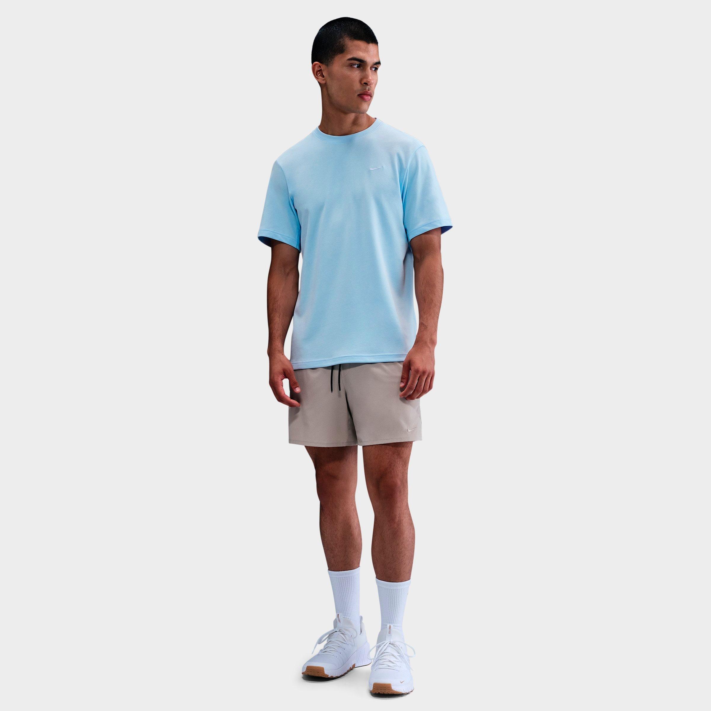 Click here for Nike Mens Dri-FIT Primary Versatile Top in Celesti... prices