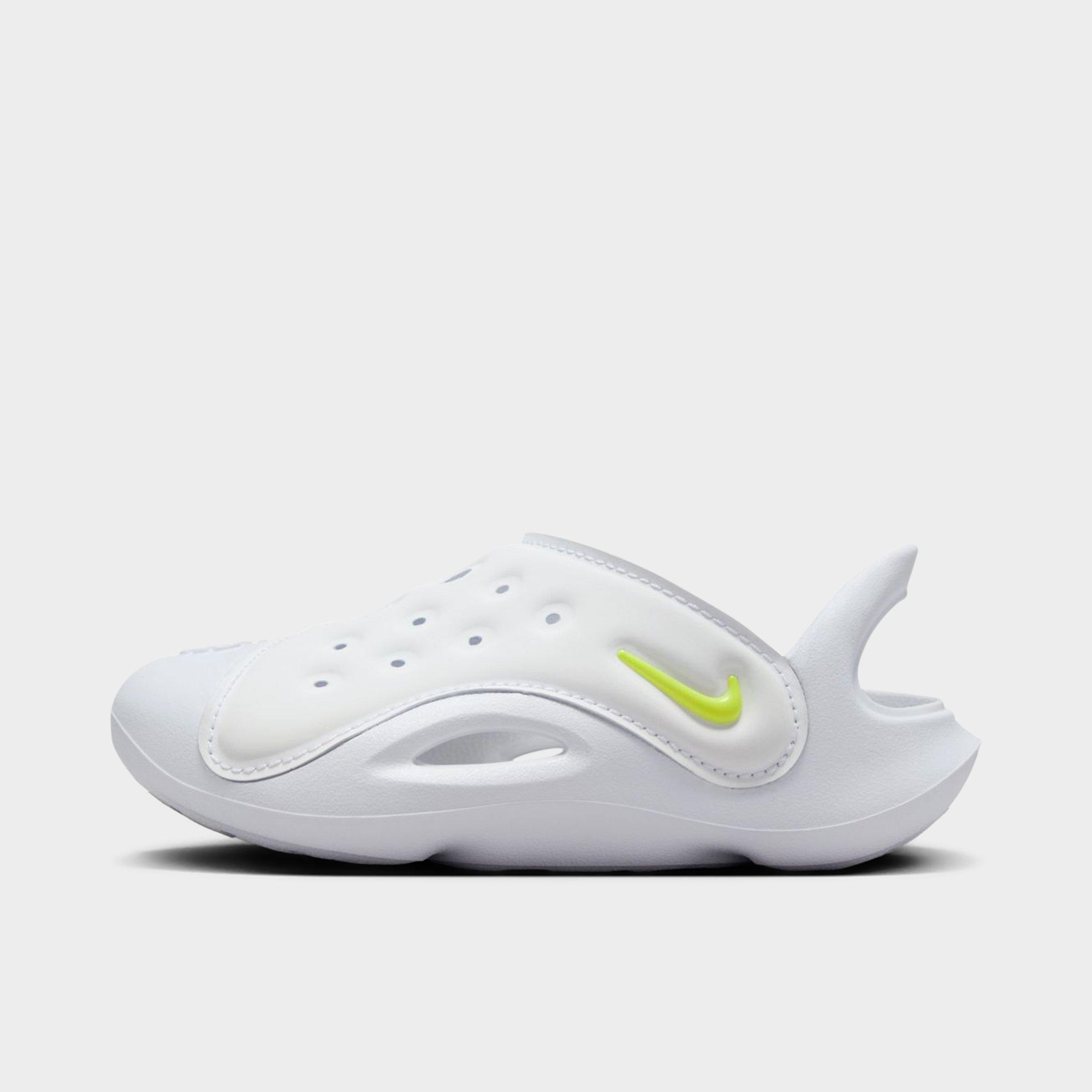 Click here for Nike Kids Toddler Aqua Swoosh Sandals in White/Vol... prices