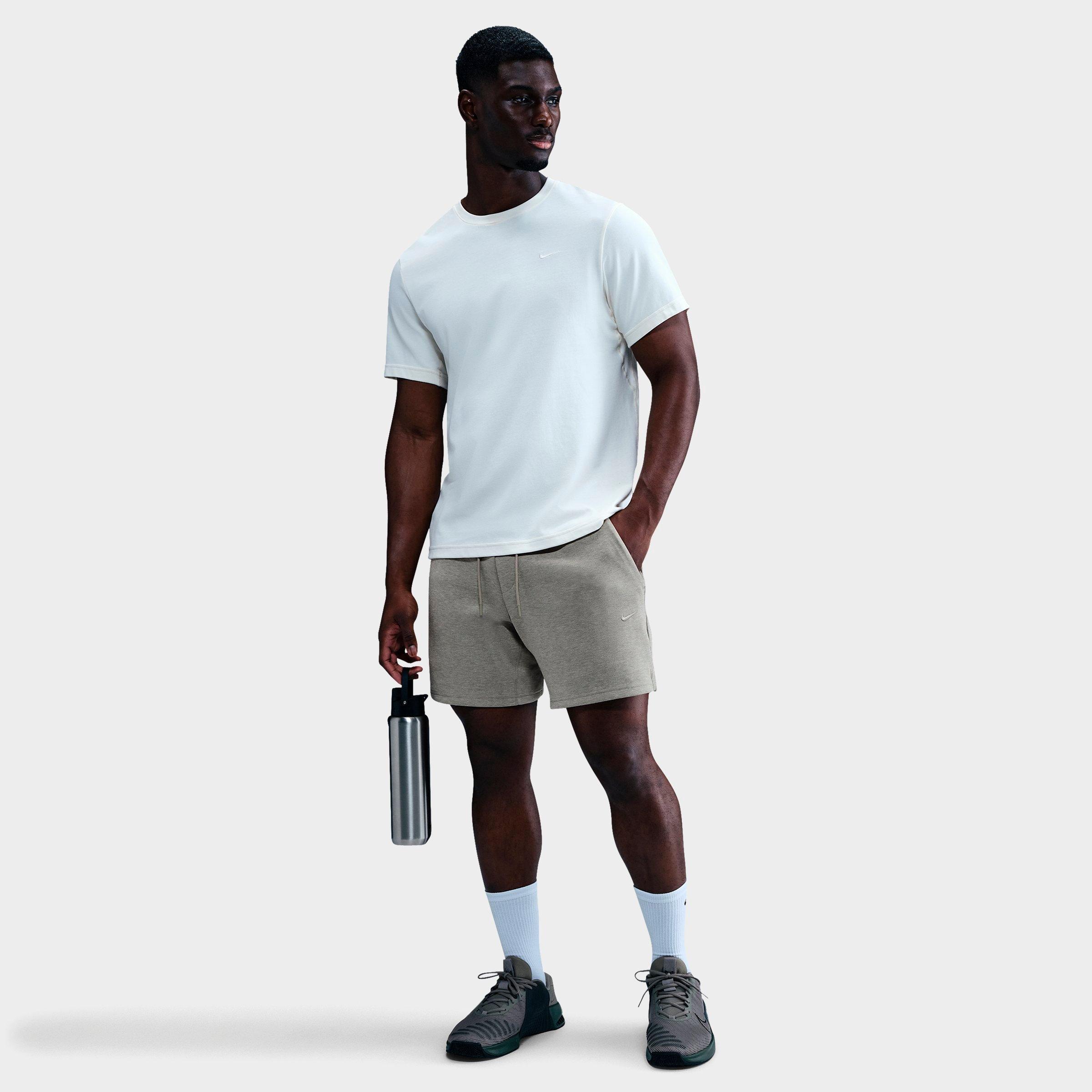 Click here for Nike Mens Primary Dri-FIT UV Unlined 7 Versatile S... prices