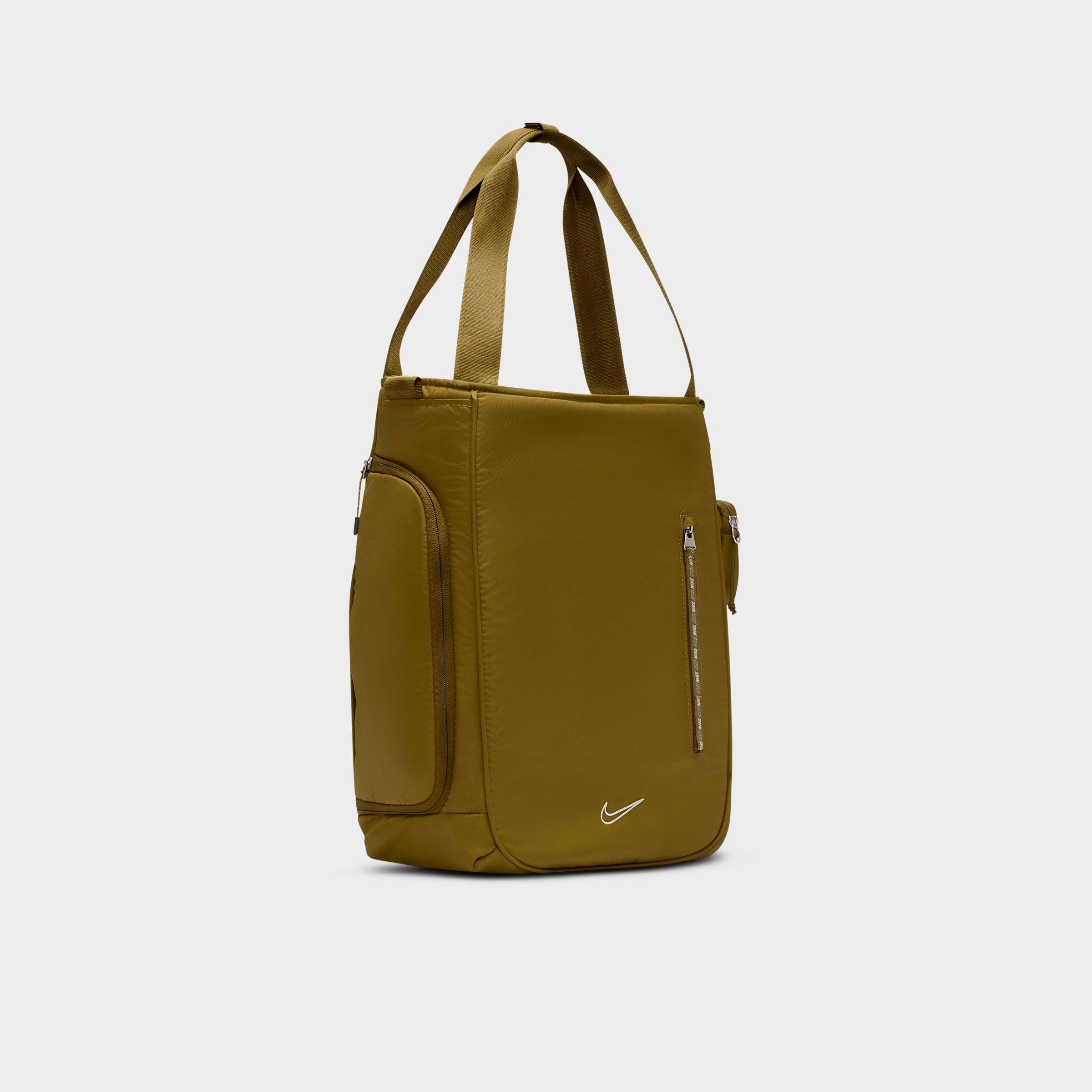 Click here for Nike Sportswear Commute Tote Bag (20L) in Olive Fl... prices