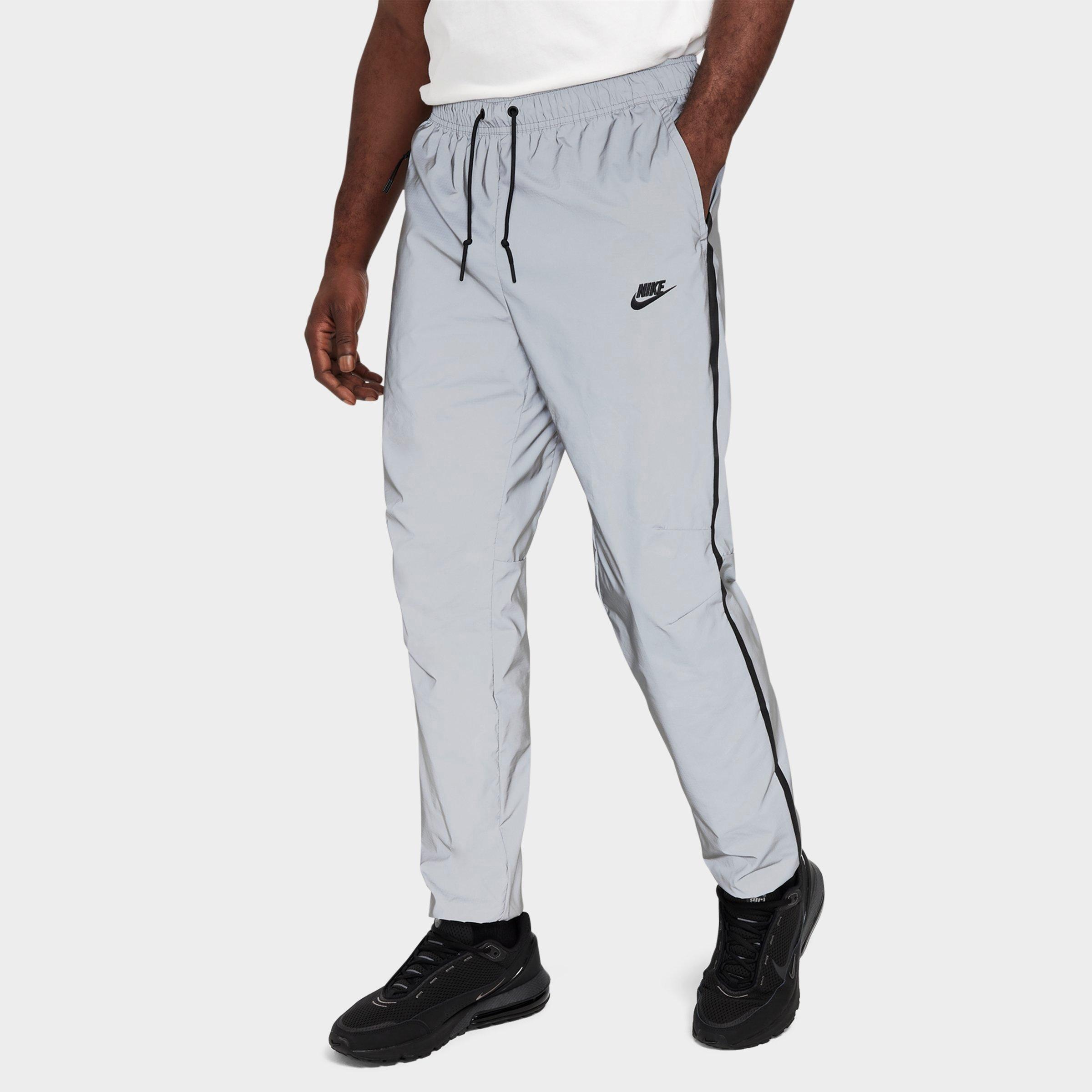 Click here for Nike Mens Tech Woven Flash Jogger Pants in Reflect... prices