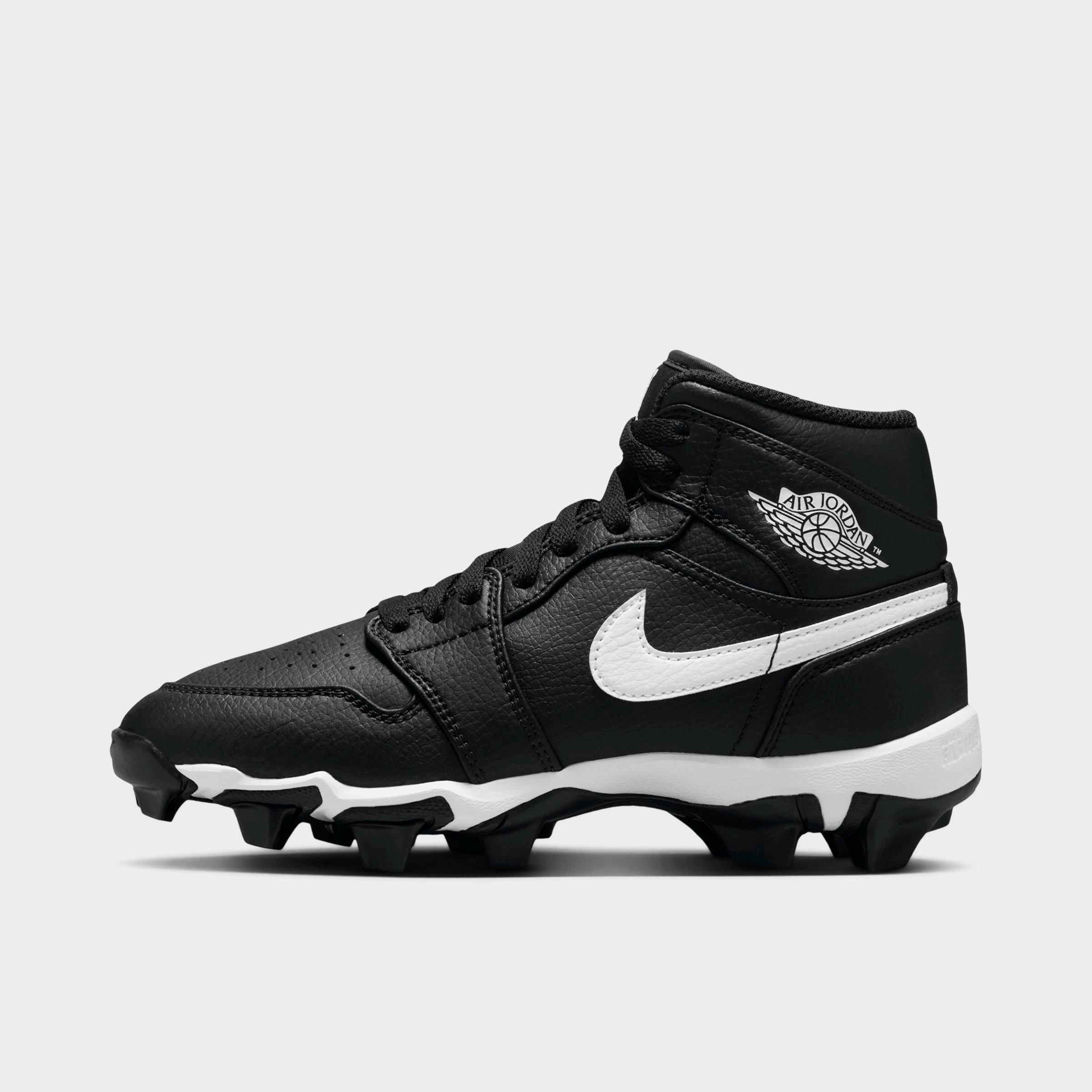 Click here for Jordan Big Kids Air Retro 1 Mid Cleats in Black/Wh... prices