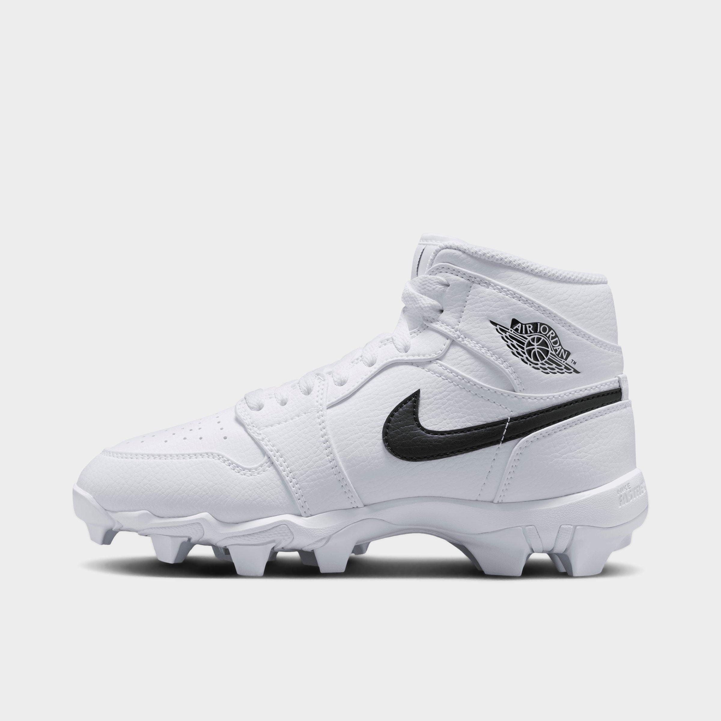 Click here for Jordan Big Kids Air Retro 1 Mid Cleats in White/Bl... prices