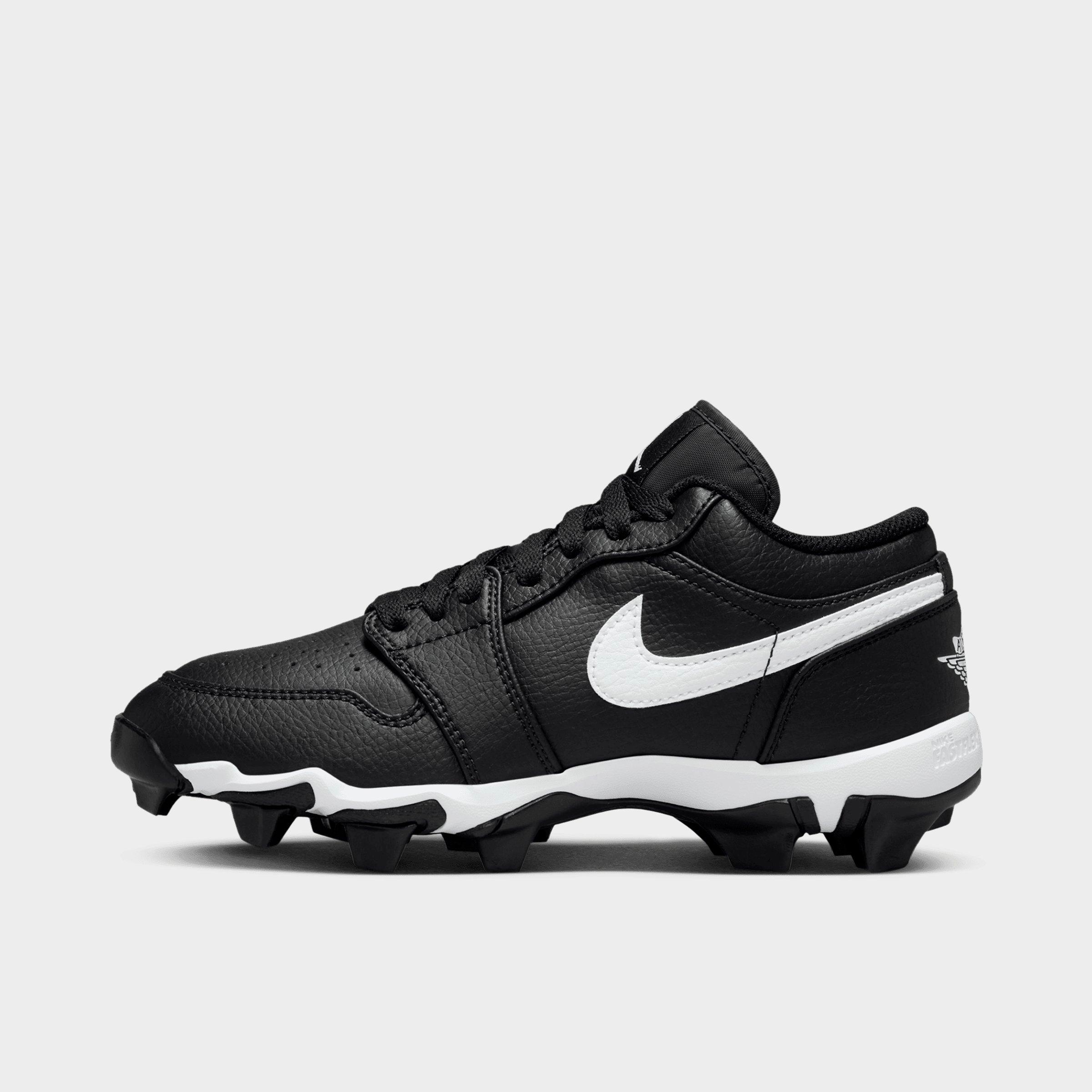 Click here for Jordan Big Kids Air Retro 1 Low Cleats in Black/Wh... prices