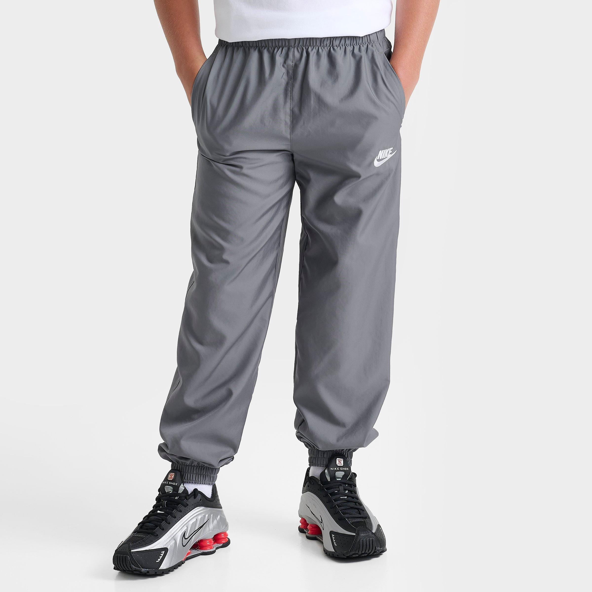 Click here for Nike Big Kids Sportswear Club Woven Jogger Pants i... prices