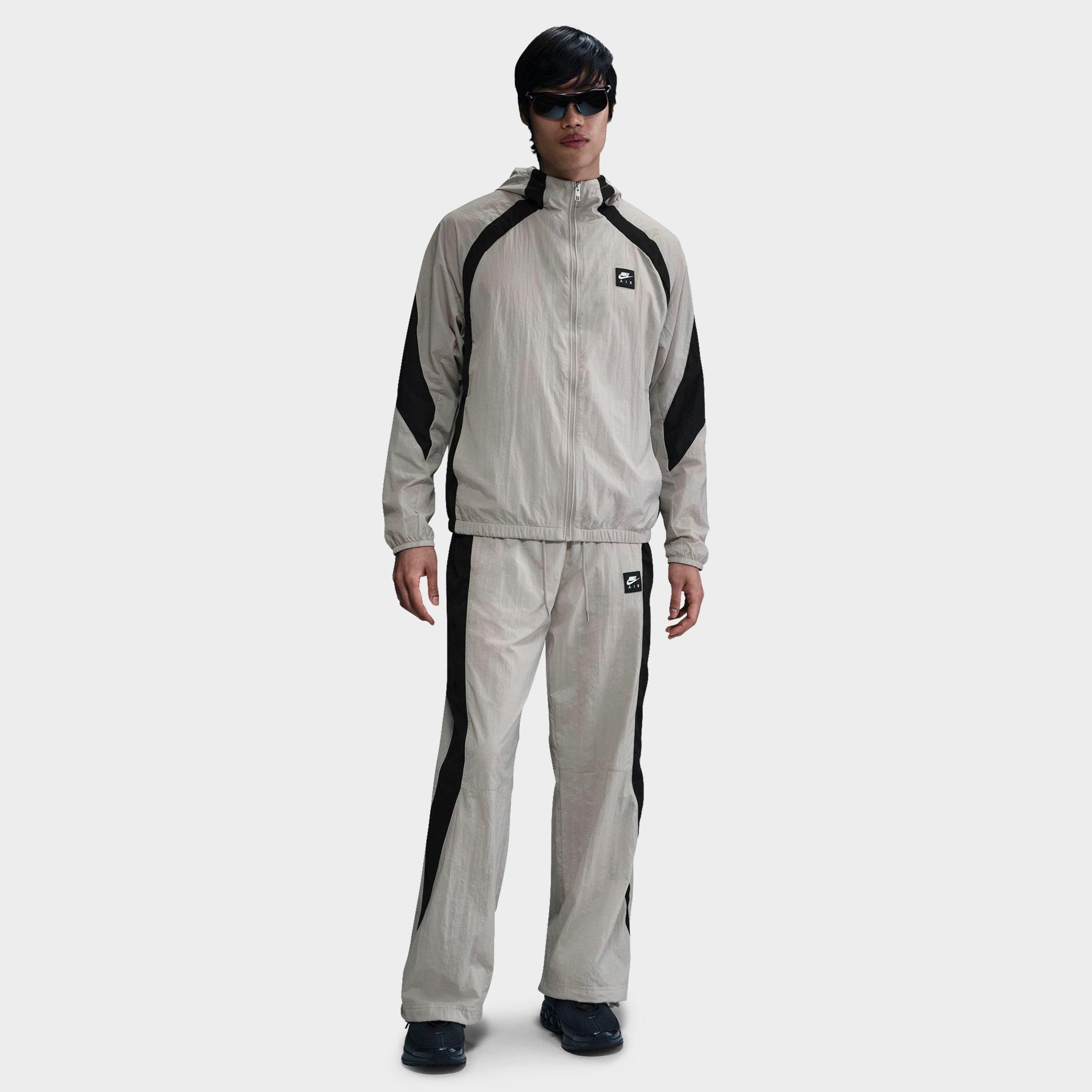 Click here for Nike Mens Air Woven Jacket in College Grey/Black S... prices