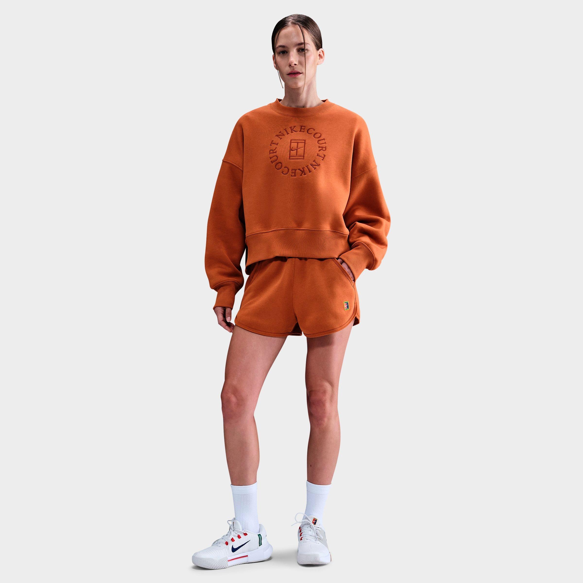 Click here for Nike Womens Court Mid-Rise Fleece Tennis Shorts in... prices