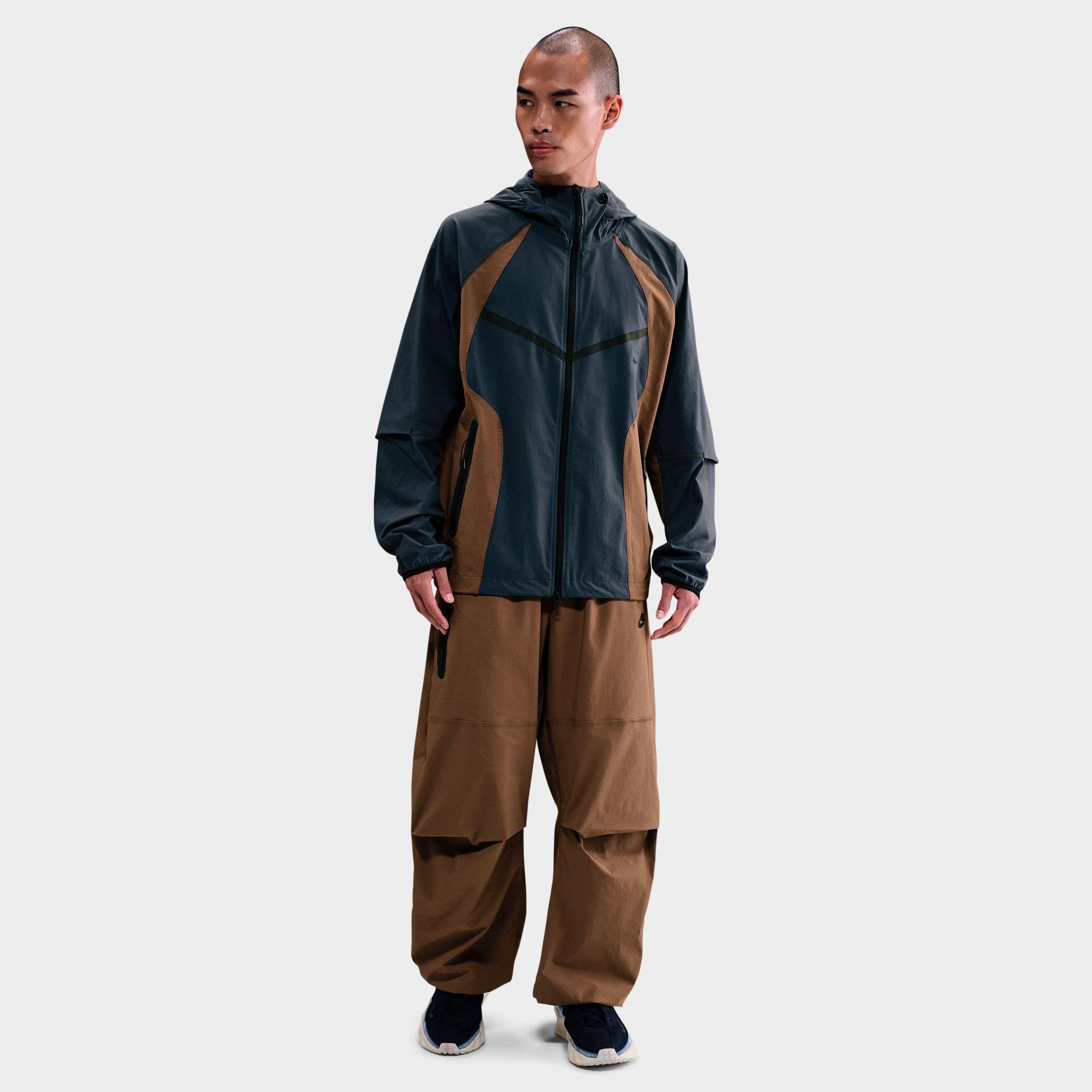 Click here for Nike Mens Tech Woven Oversized Pants in Mosswood B... prices