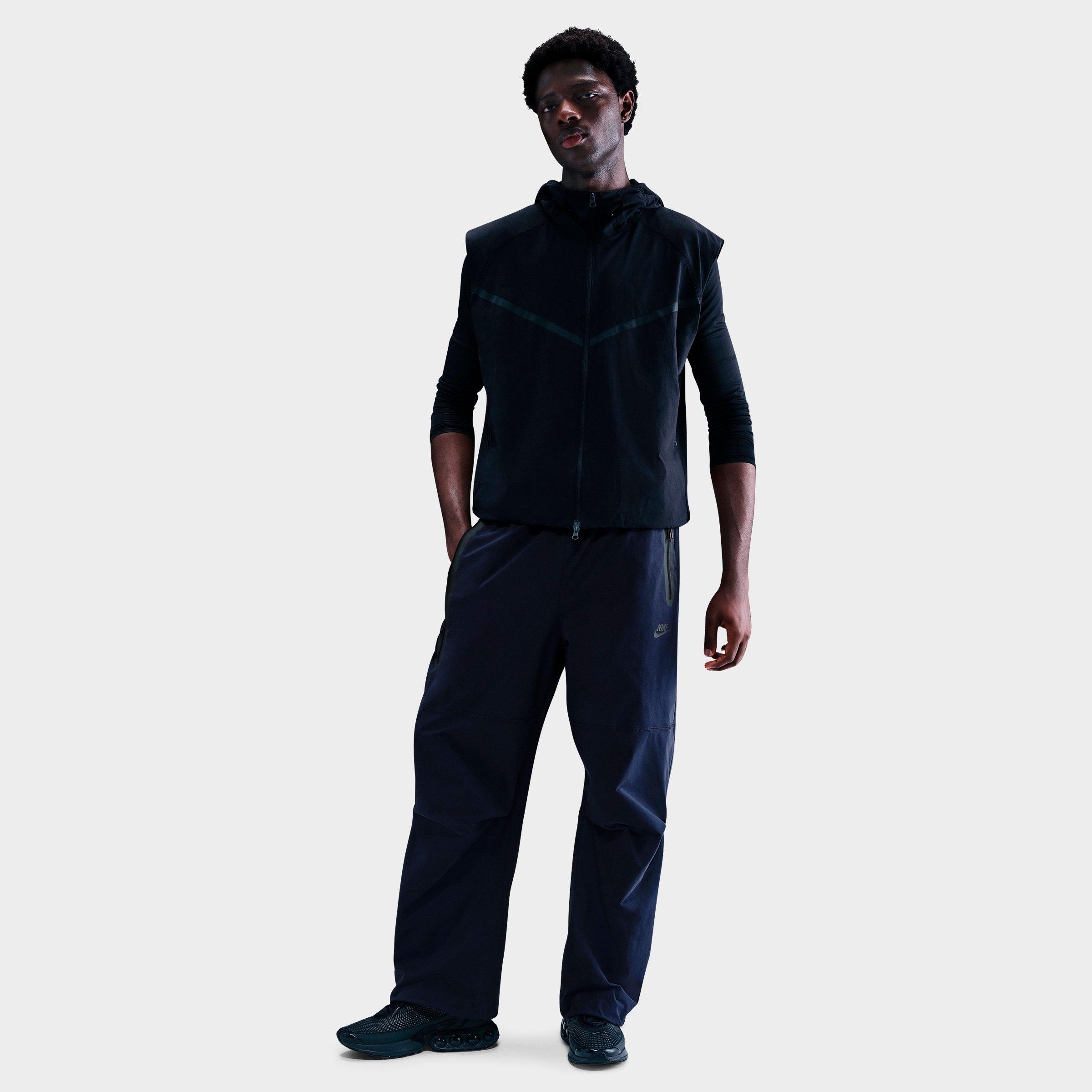 Click here for Nike Mens Tech Woven Oversized Pants in Obsidian/B... prices