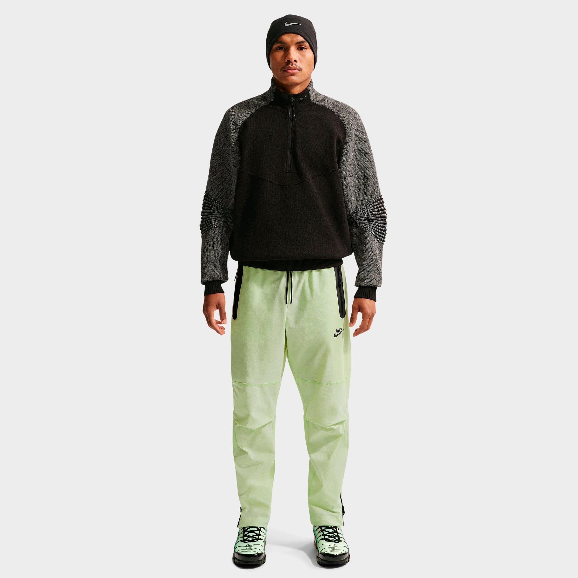 Click here for Nike Mens Tech Woven Pants in Light Liquid Lime/Bl... prices