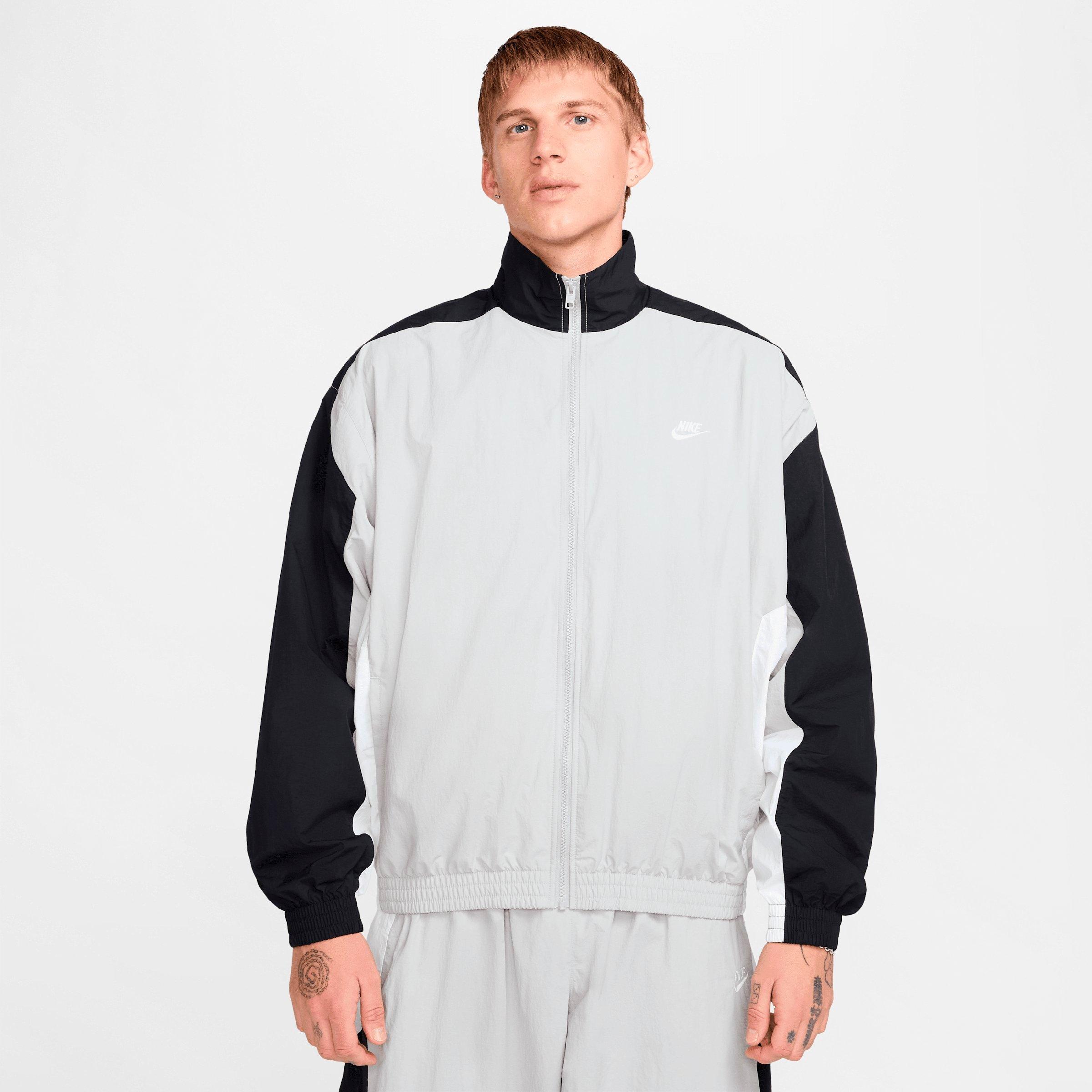 Click here for Nike Mens Club Woven Oversized Track Jacket in Lig... prices