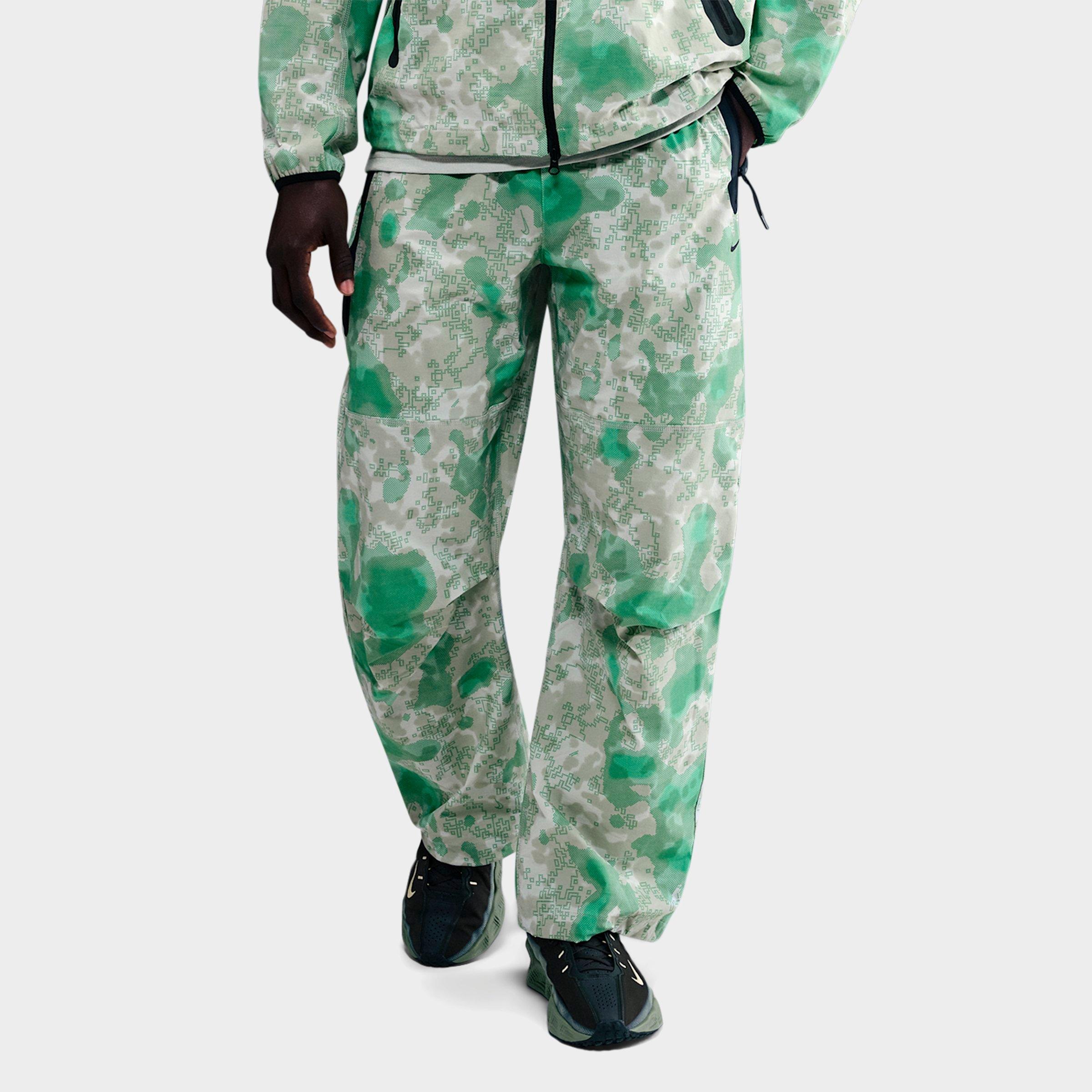Click here for Nike Mens Tech Dri-FIT Woven Camo Loose-Fit Pants... prices