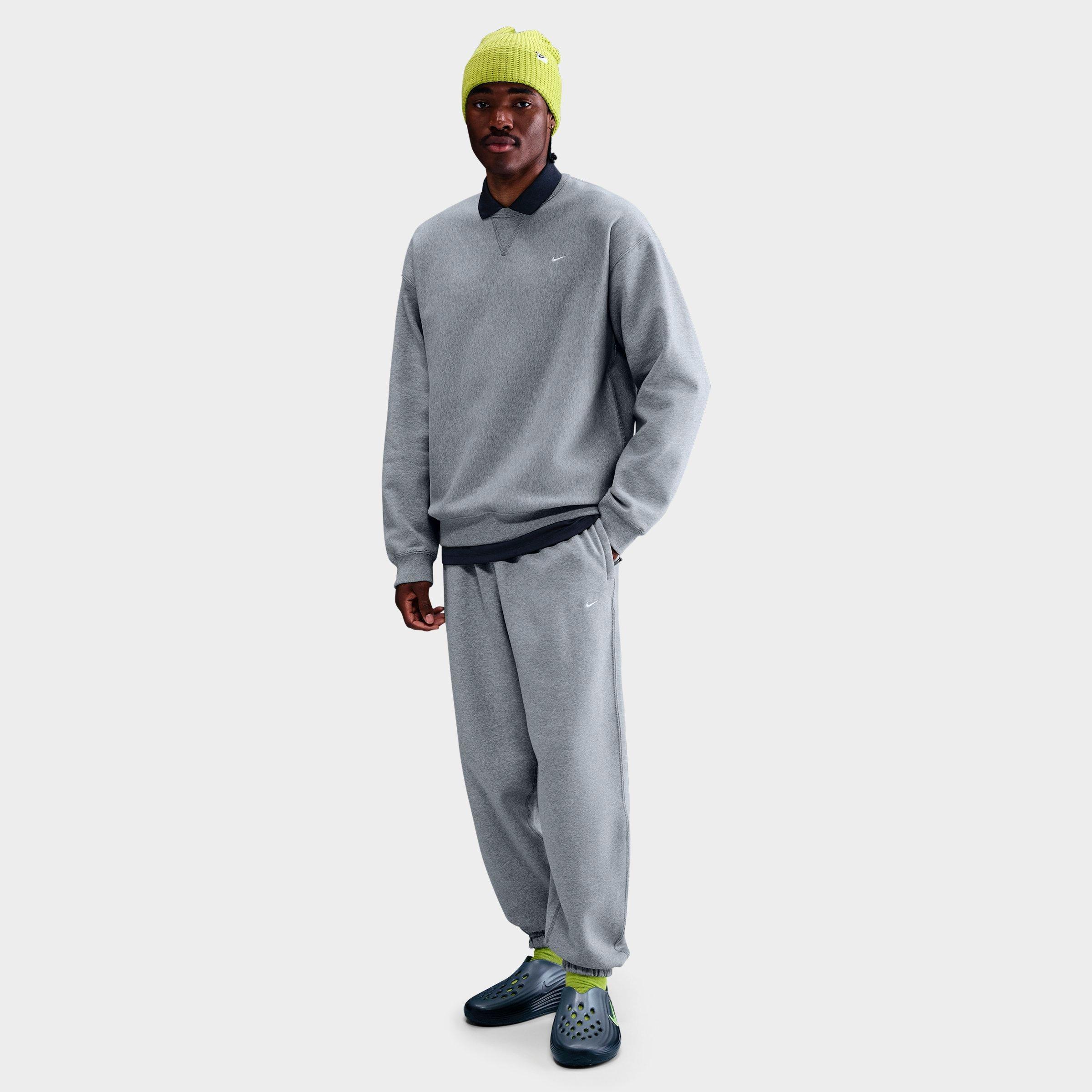 Click here for Nike Mens Solo Swoosh Cuffed Fleece Pants in Dark... prices