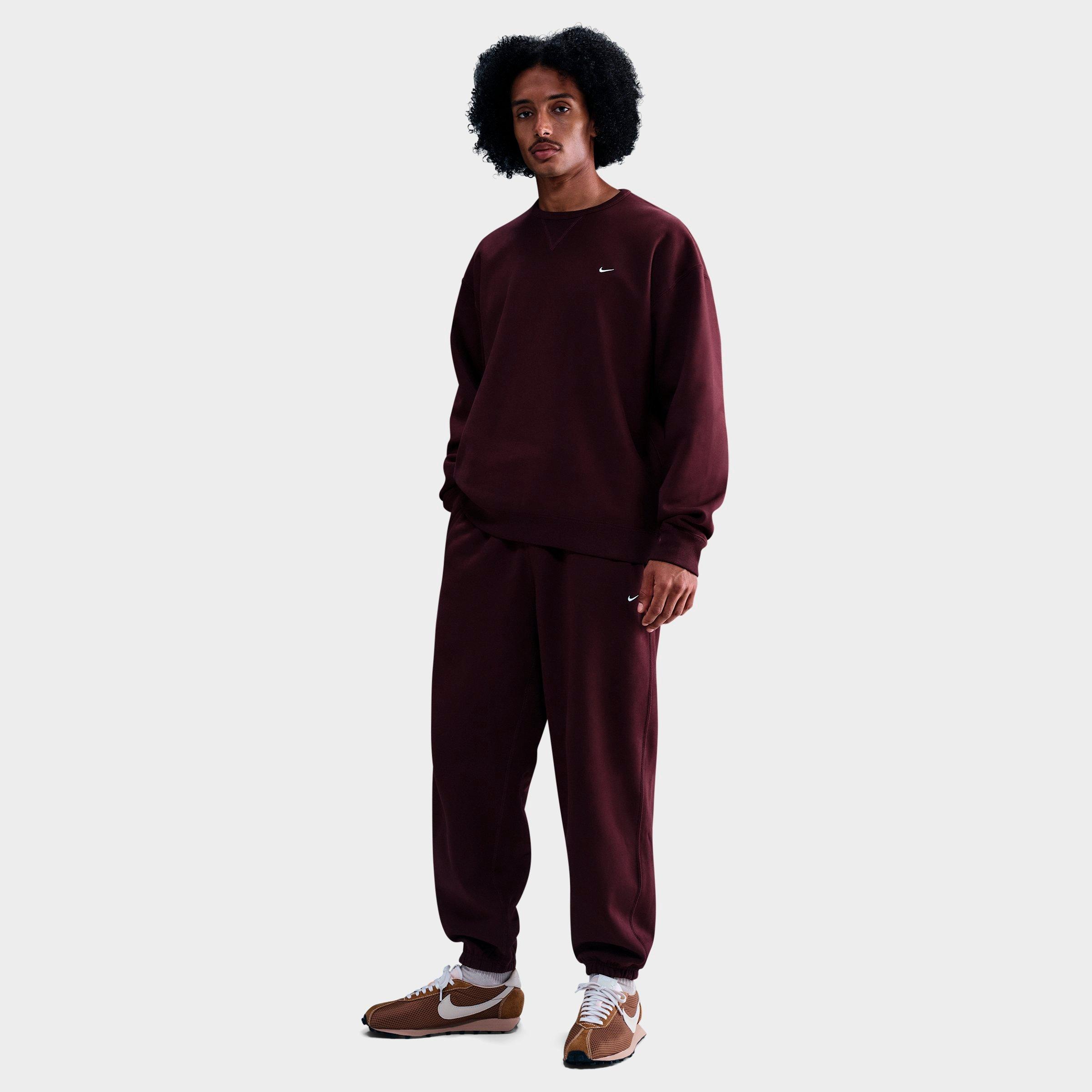 Click here for Nike Mens Solo Swoosh Cuffed Fleece Pants in Burgu... prices