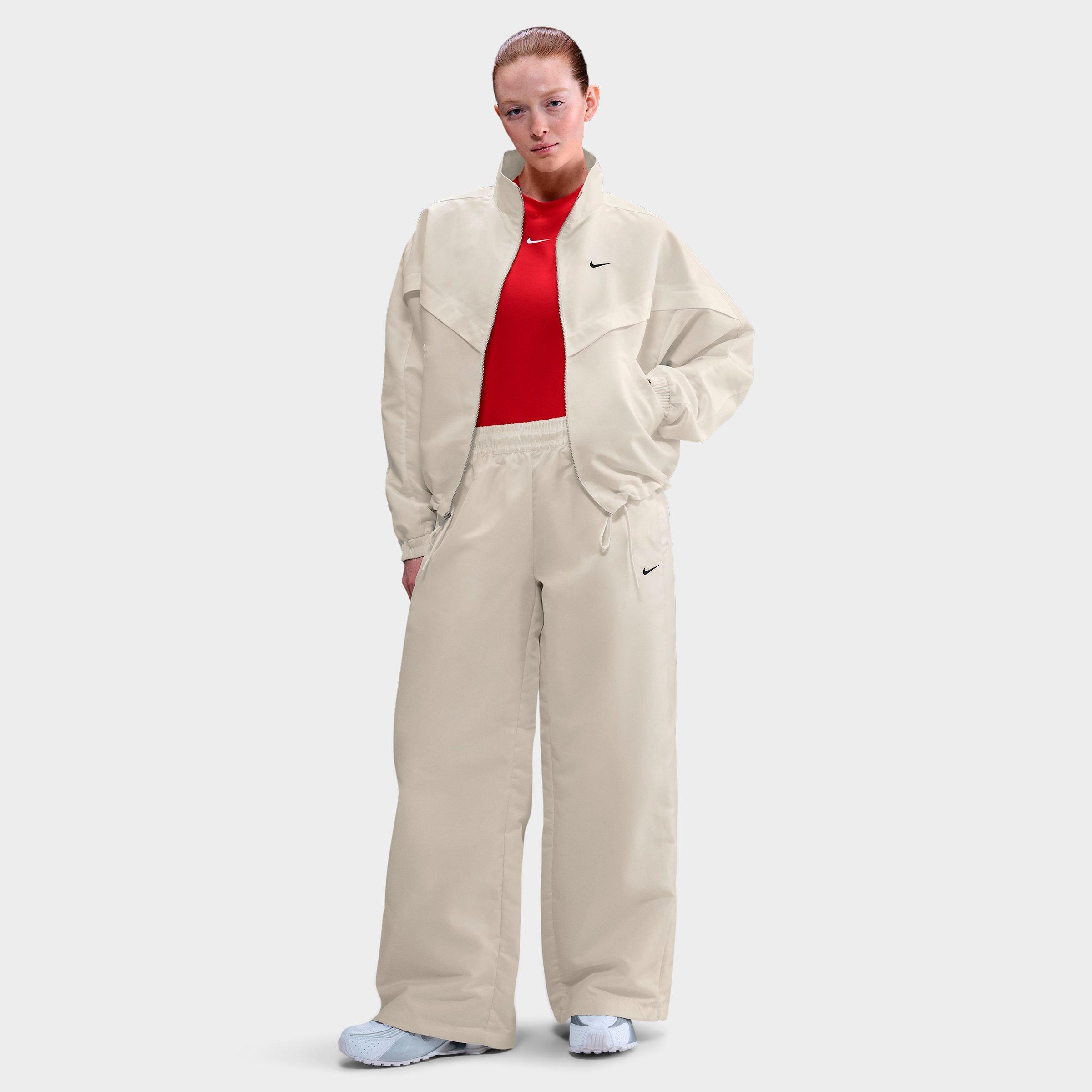 Click here for Nike Womens Sportswear Windrunner Shine Jacket in... prices