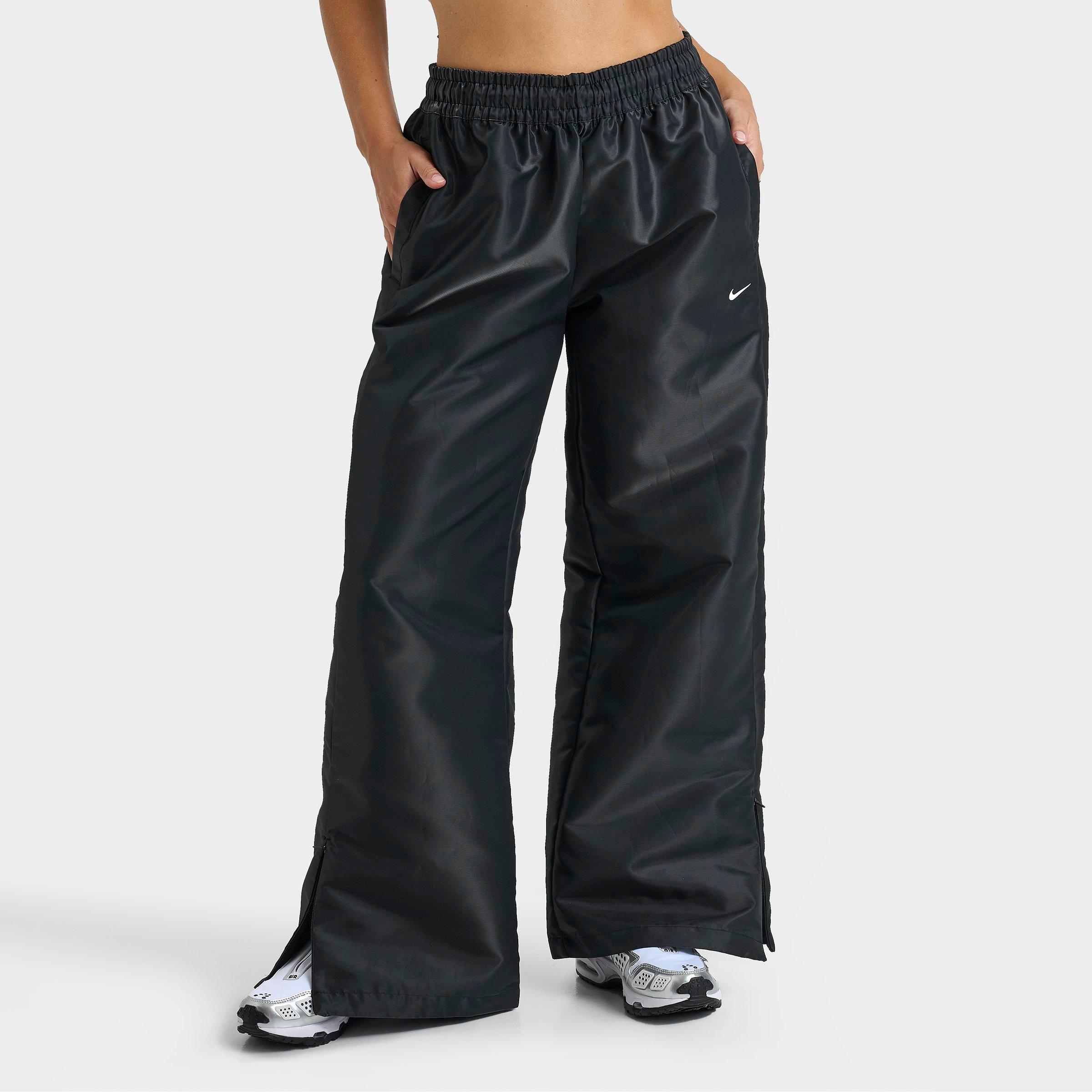 Click here for Nike Womens Sportswear Windrunner Shine Pants in B... prices