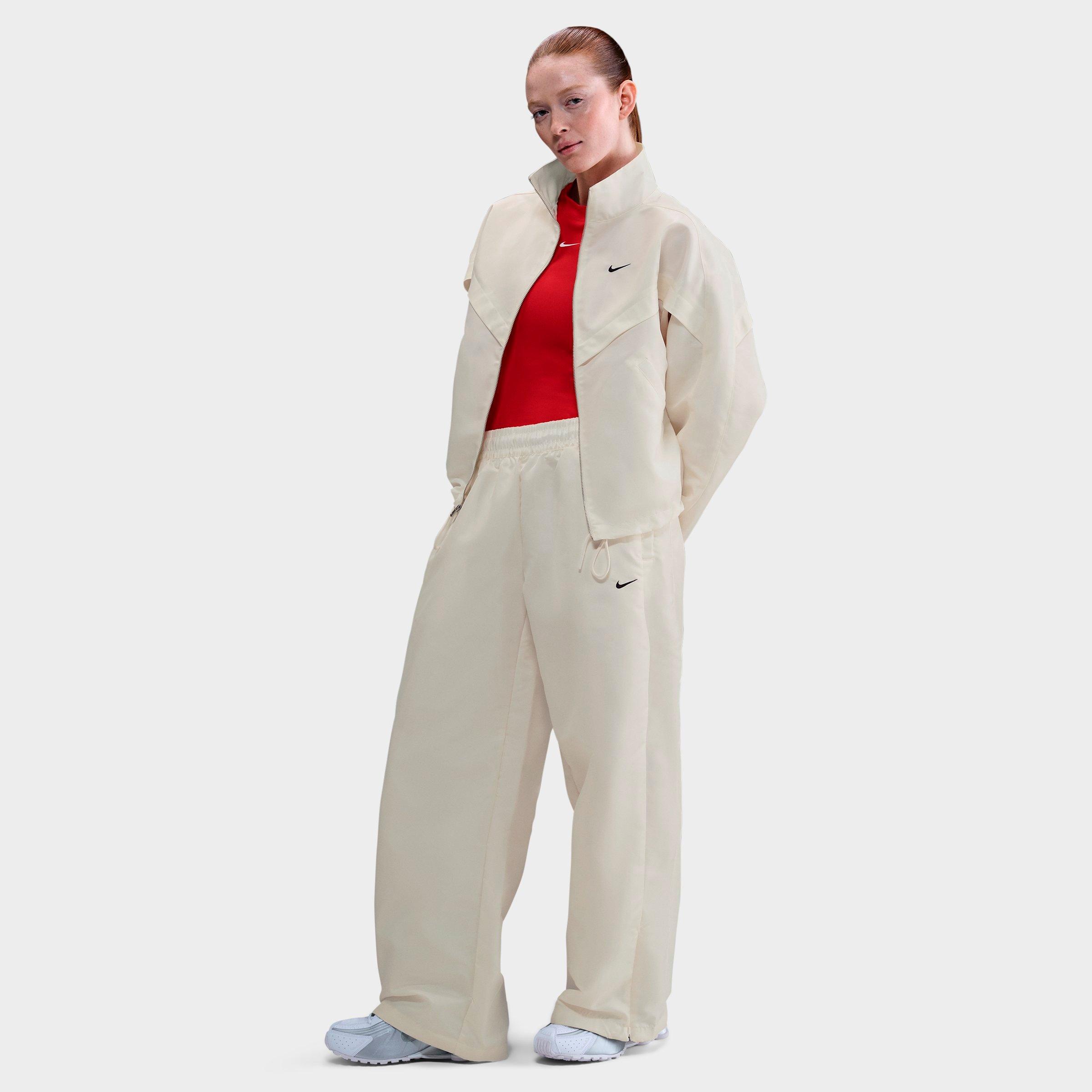 Click here for Nike Womens Sportswear Windrunner Shine Pants in S... prices