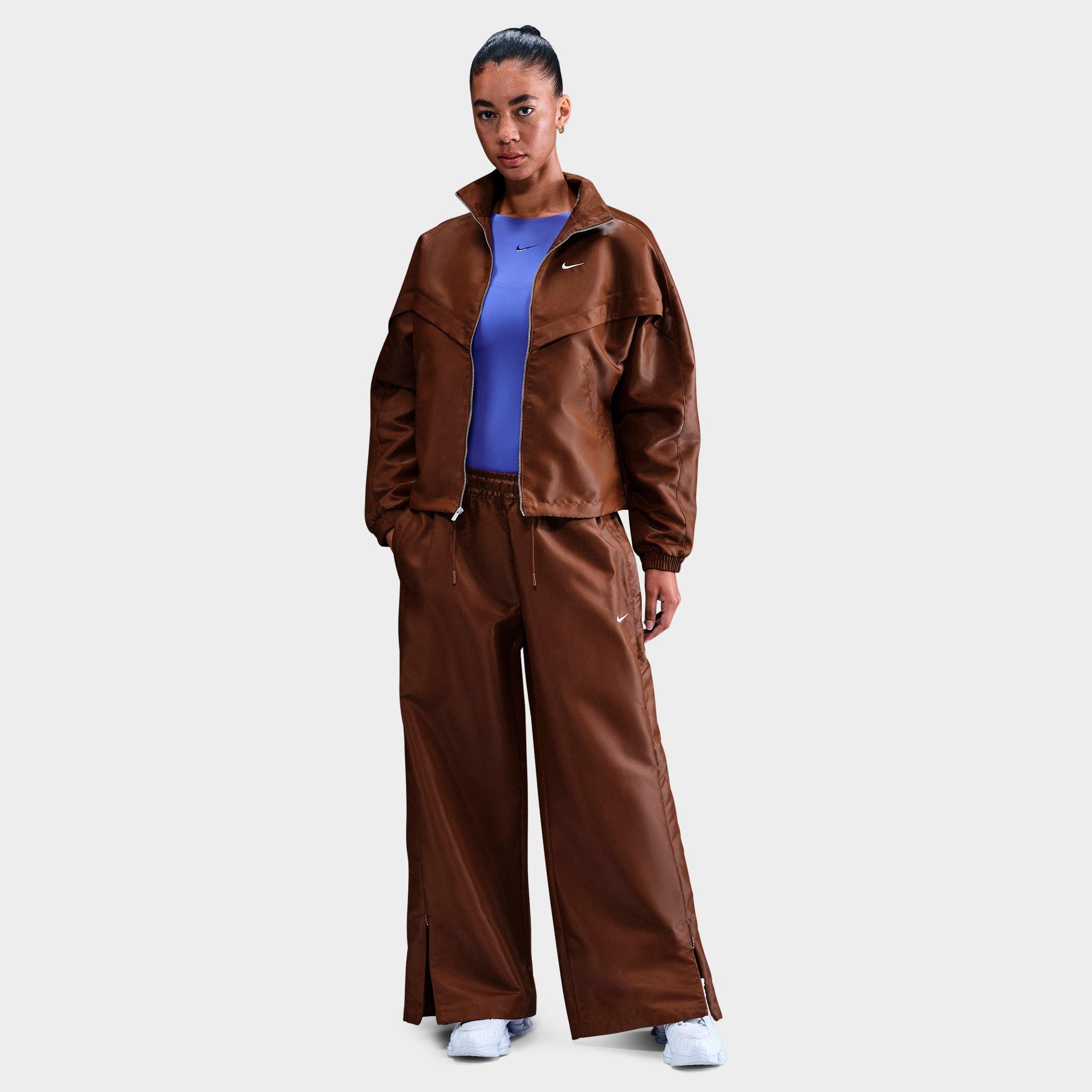 Click here for Nike Womens Sportswear Windrunner Shine Pants in F... prices