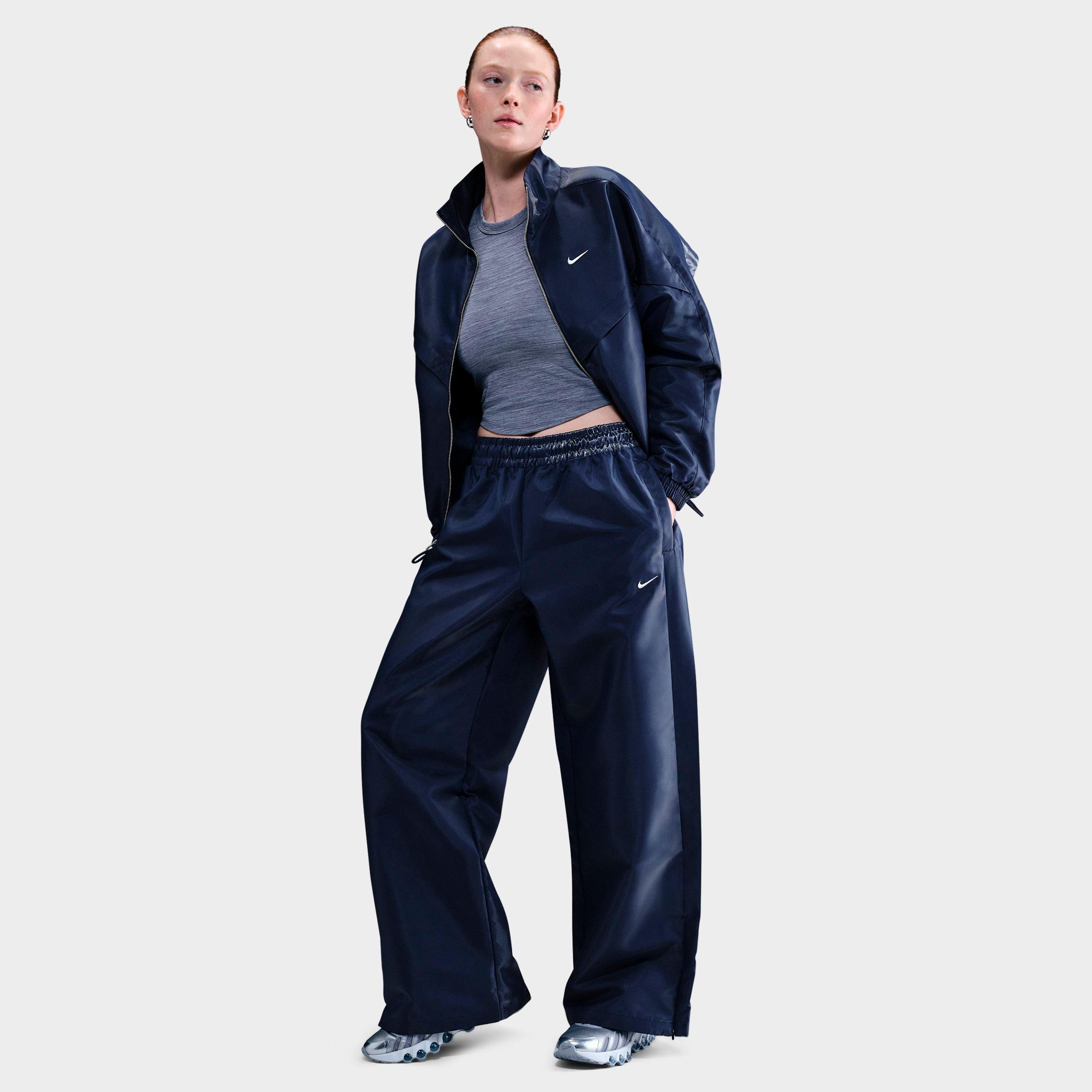Click here for Nike Womens Sportswear Windrunner Shine Pants in M... prices