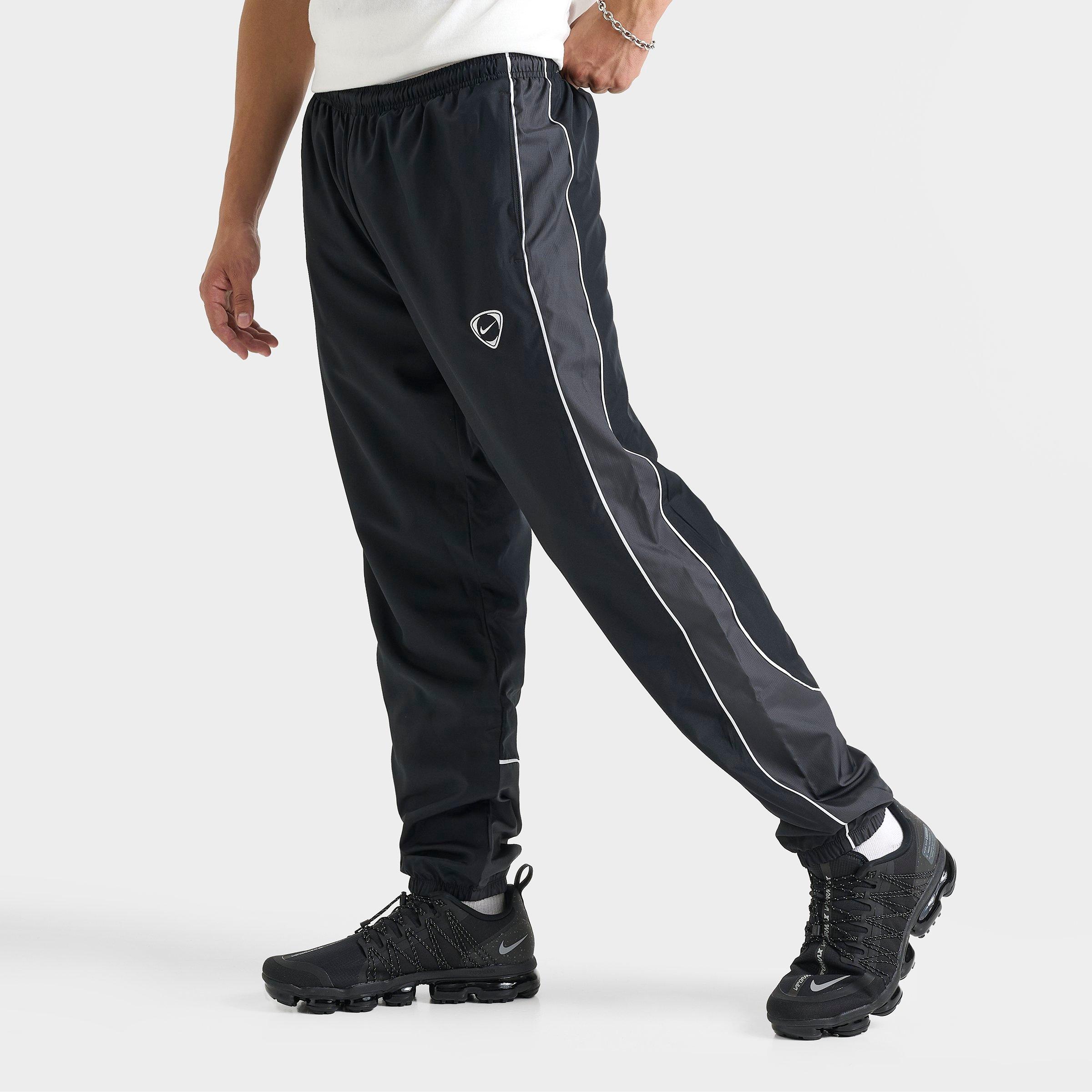 Click here for Nike Mens Academy+ Repel Woven Soccer Pants in Bla... prices