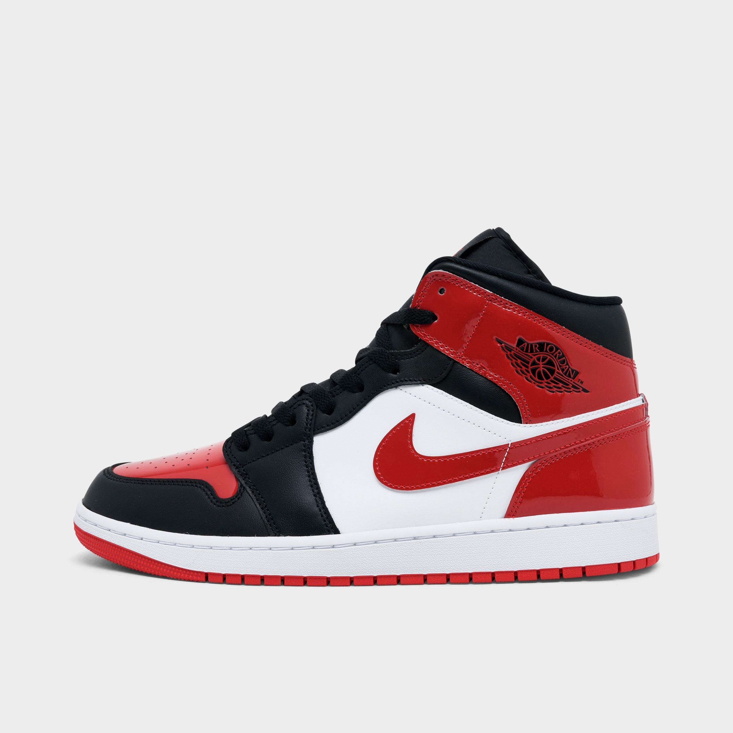 Click here for Jordan Mens Air Retro 1 Mid SE Casual Shoes in Bla... prices