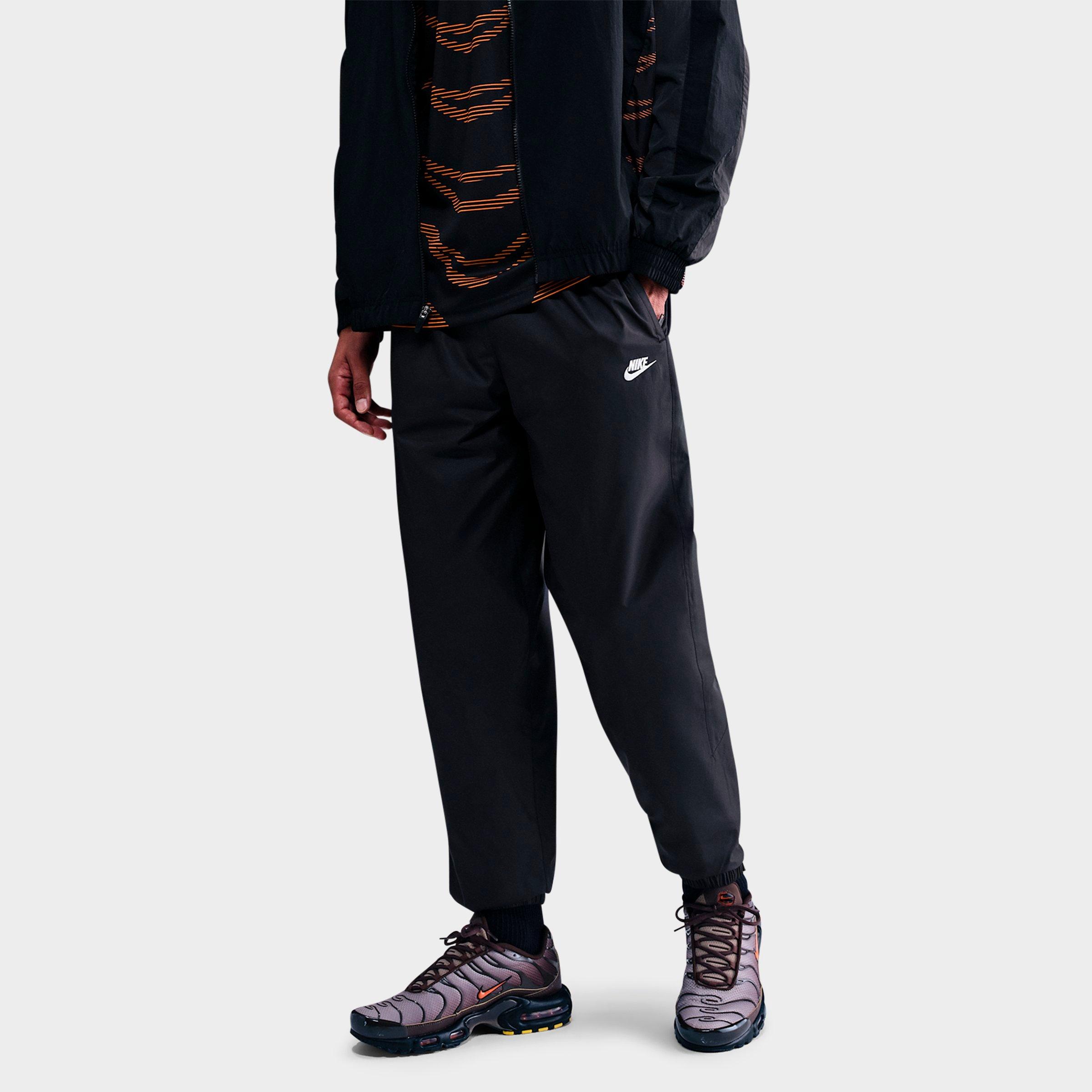 Click here for Nike Mens Windrunner Lined Pants in Black/White Si... prices