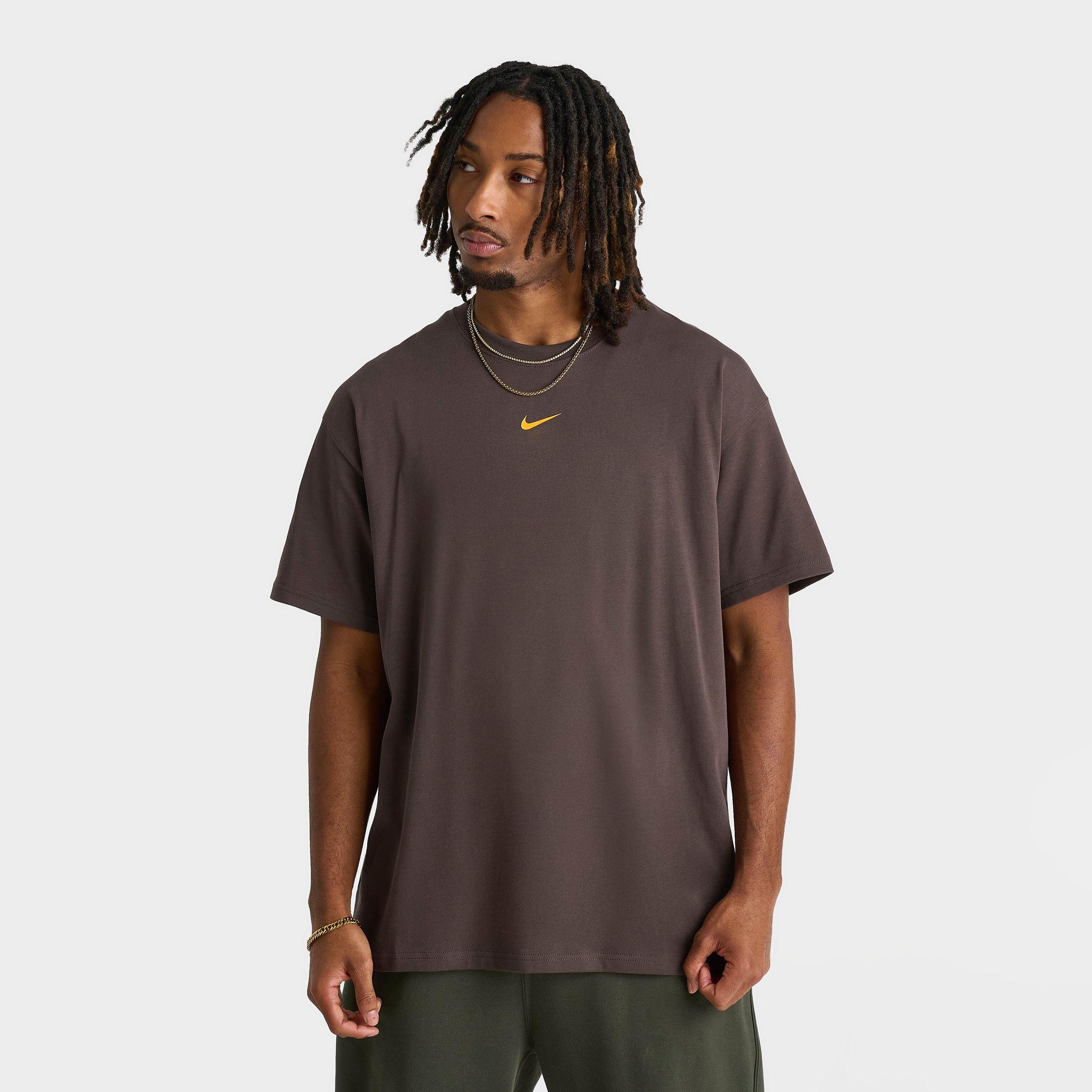 Click here for Nike Mens NOCTA NRG 2 T-Shirt in Baroque Brown/Yel... prices