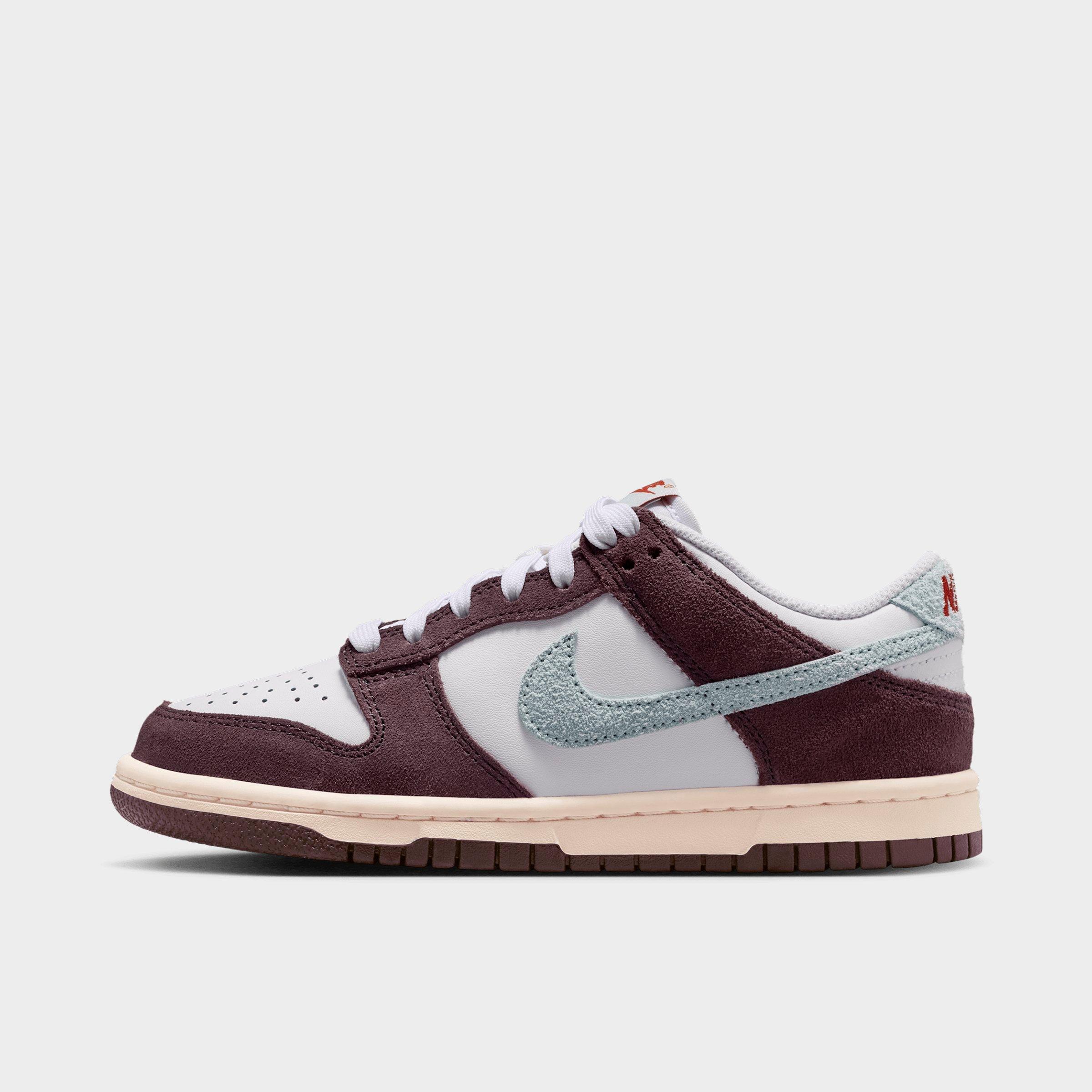 Click here for Nike Big Kids Dunk Low SE Casual Shoes in White/Bu... prices