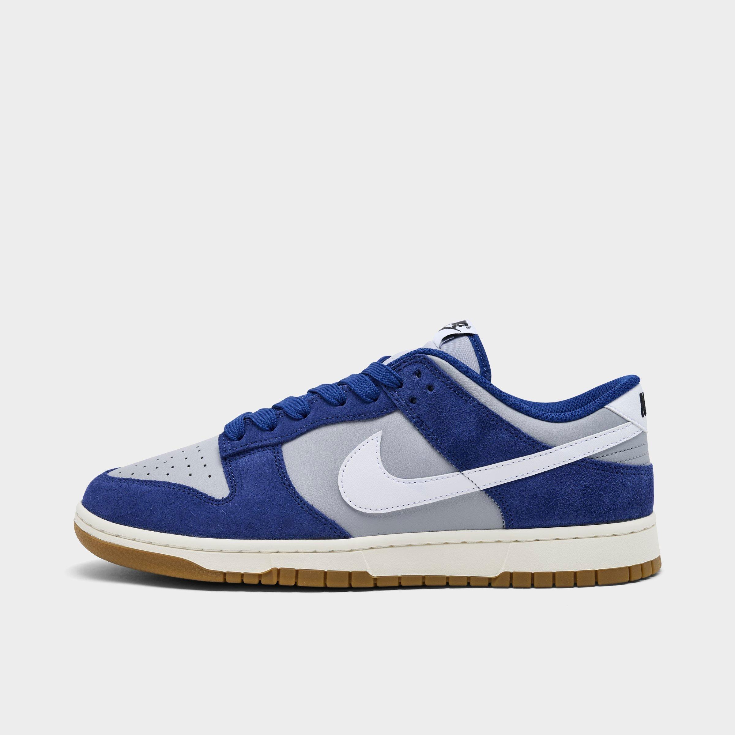 Click here for Nike Mens Dunk Low Retro SE Casual Shoes in Wolf G... prices