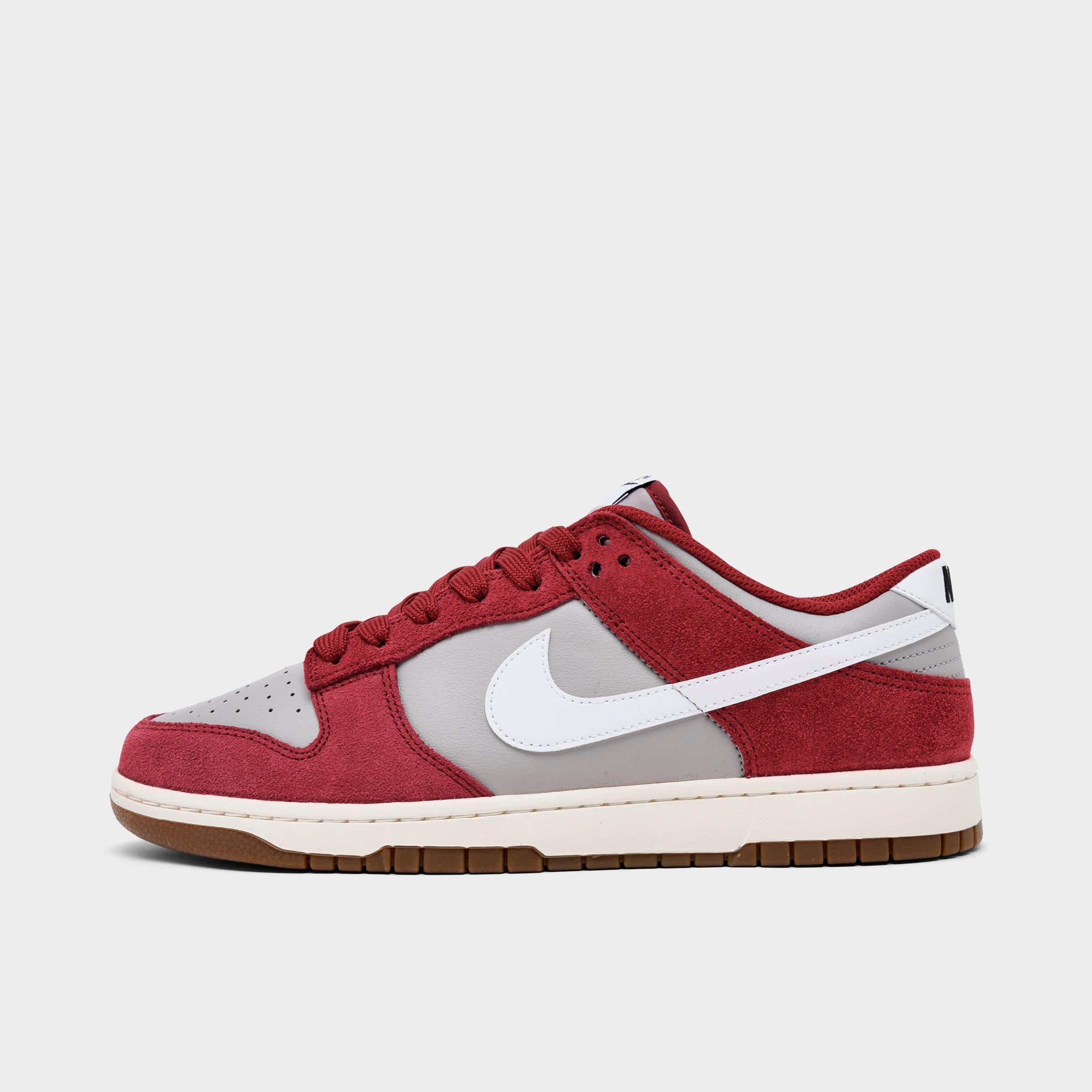 Click here for Nike Mens Dunk Low Retro SE Casual Shoes in Colleg... prices
