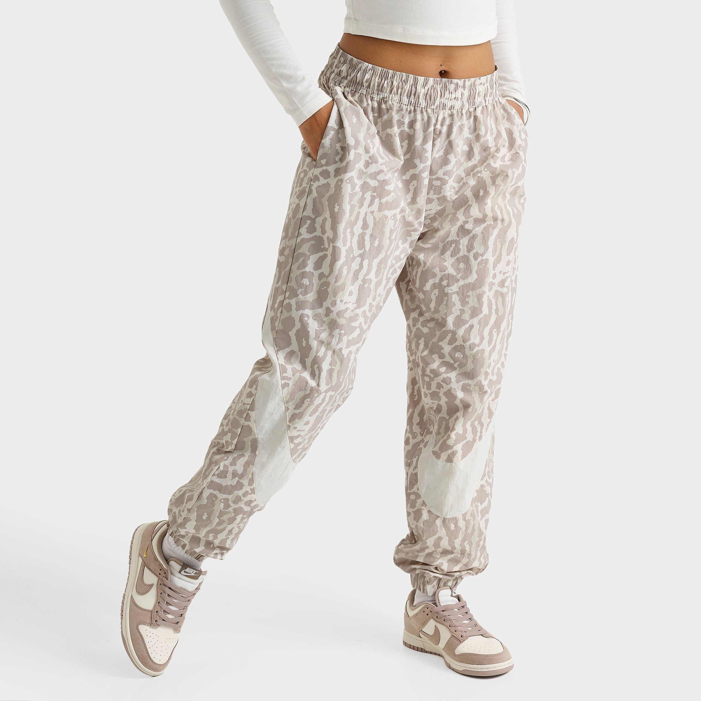 Click here for Nike Womens Printed Mid Rise Jogger Pants - Colleg... prices