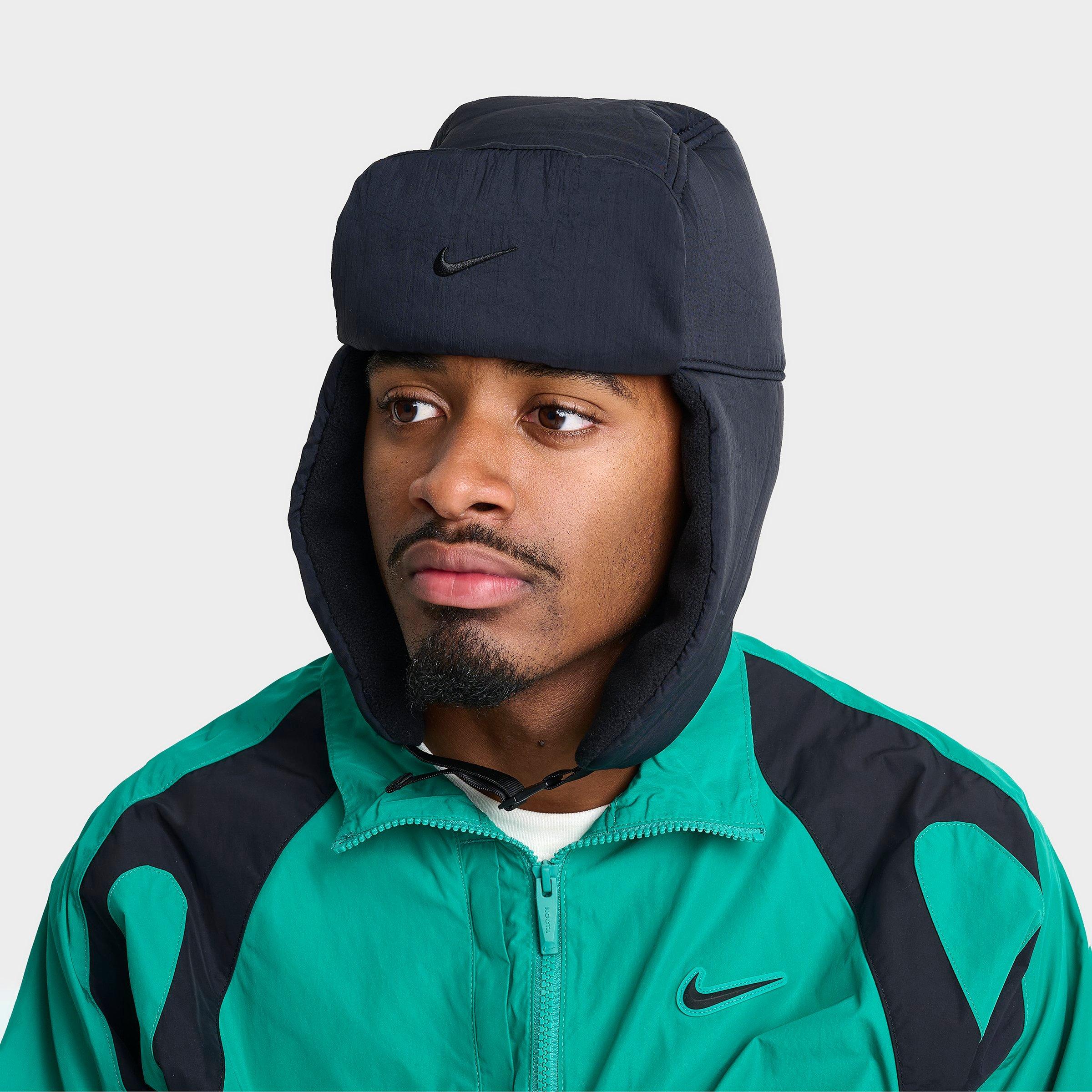 Click here for Nike Fly Unstructured Puffer Trapper Cap in Black... prices