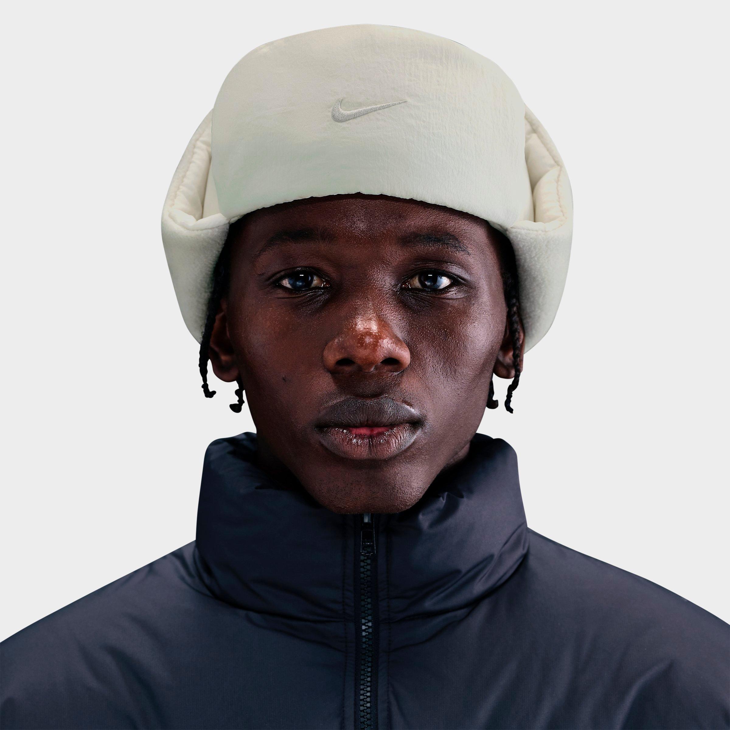 Click here for Nike Fly Unstructured Puffer Trapper Cap in Light... prices