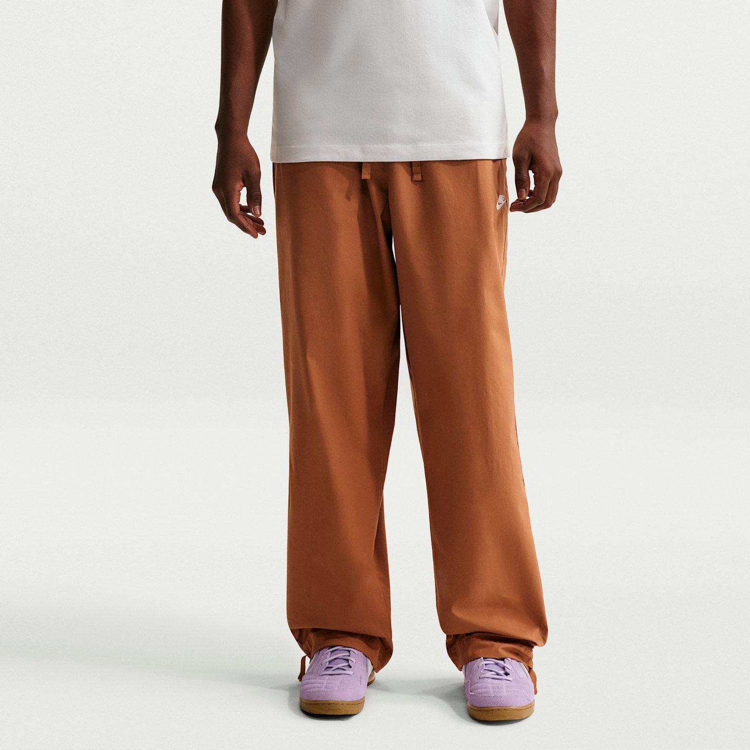 Click here for Nike Mens Sportswear Club Barcelona Woven Pants in... prices