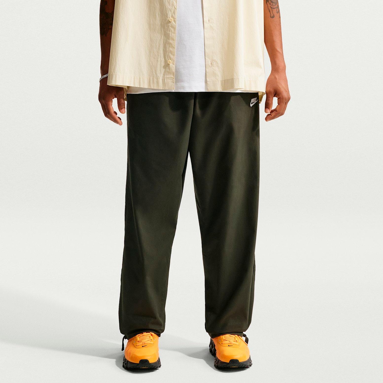Click here for Nike Mens Sportswear Club Barcelona Woven Pants in... prices